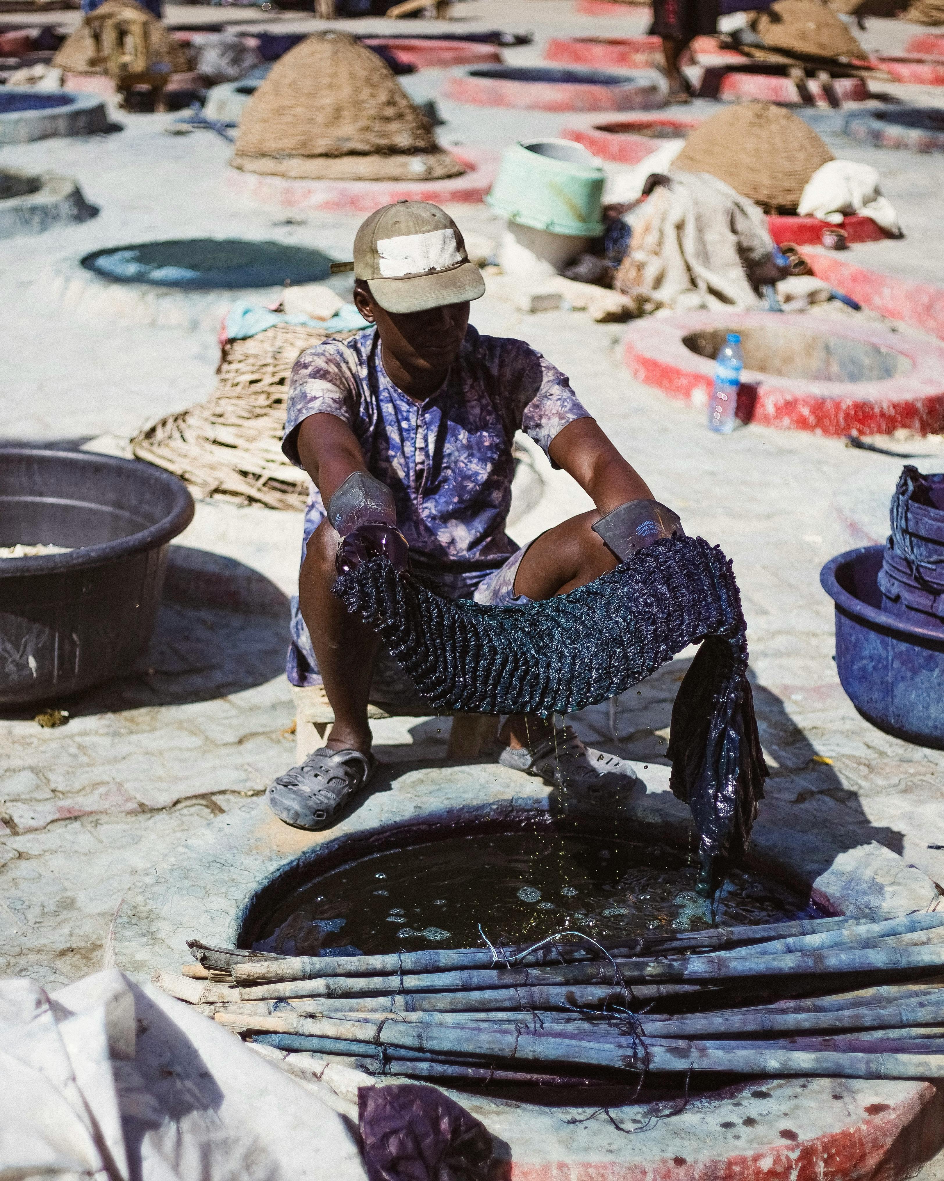 Traditional Dyeing Process in Outdoor Workshop · Free Stock Photo