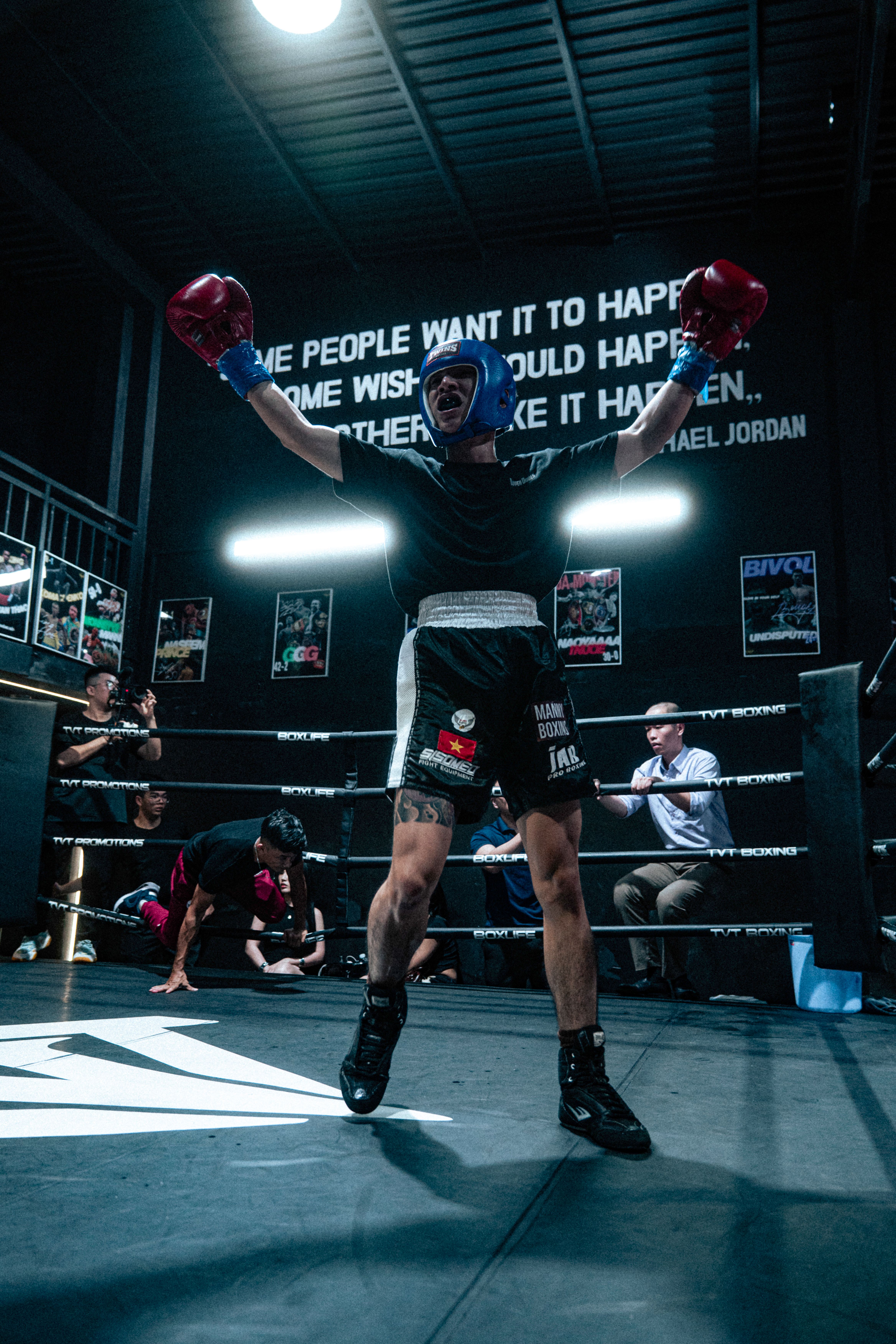 Triumphant Boxer Celebrates Victory in Ring · Free Stock Photo