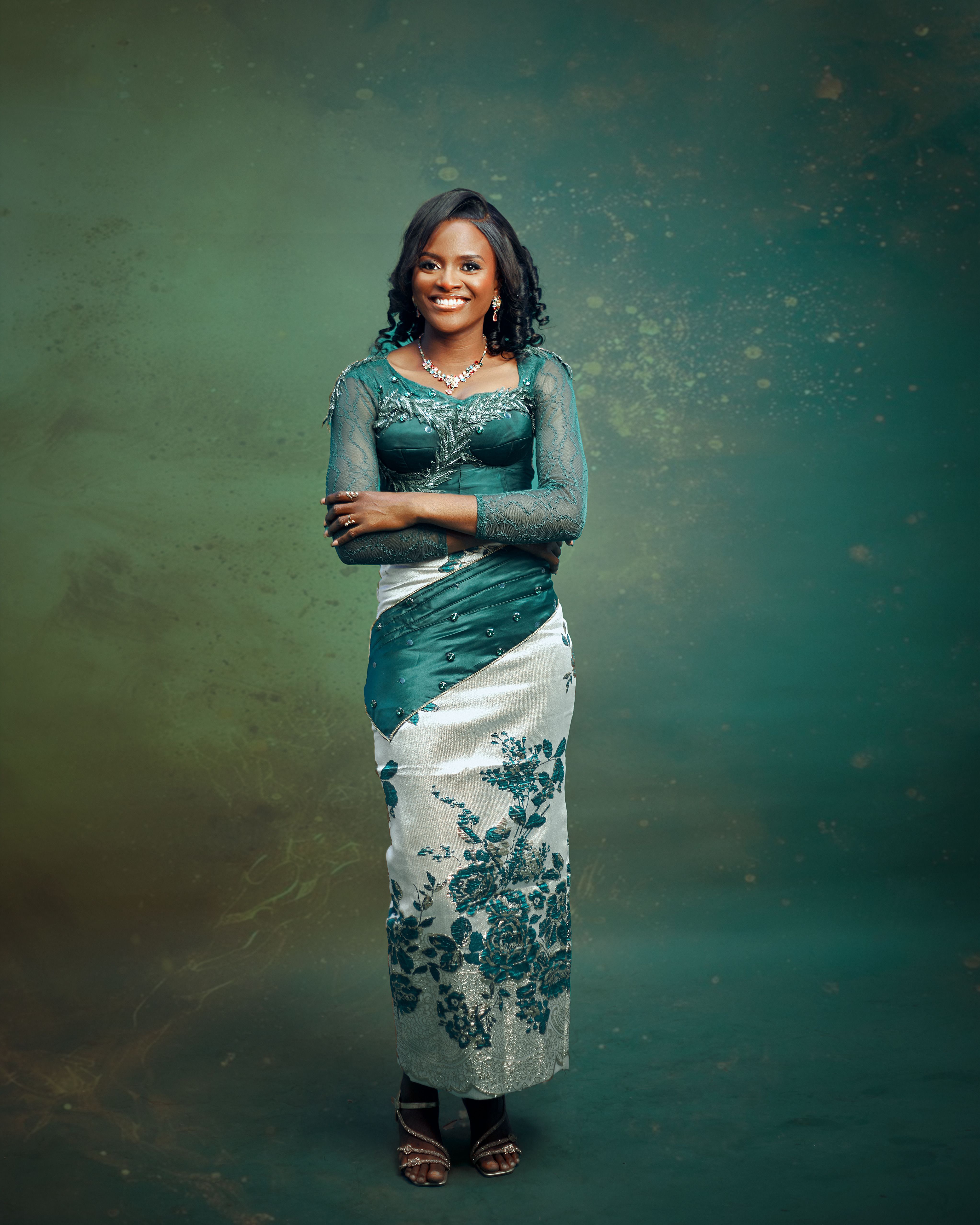 Elegant Woman in Green Traditional Dress Portrait · Free Stock Photo