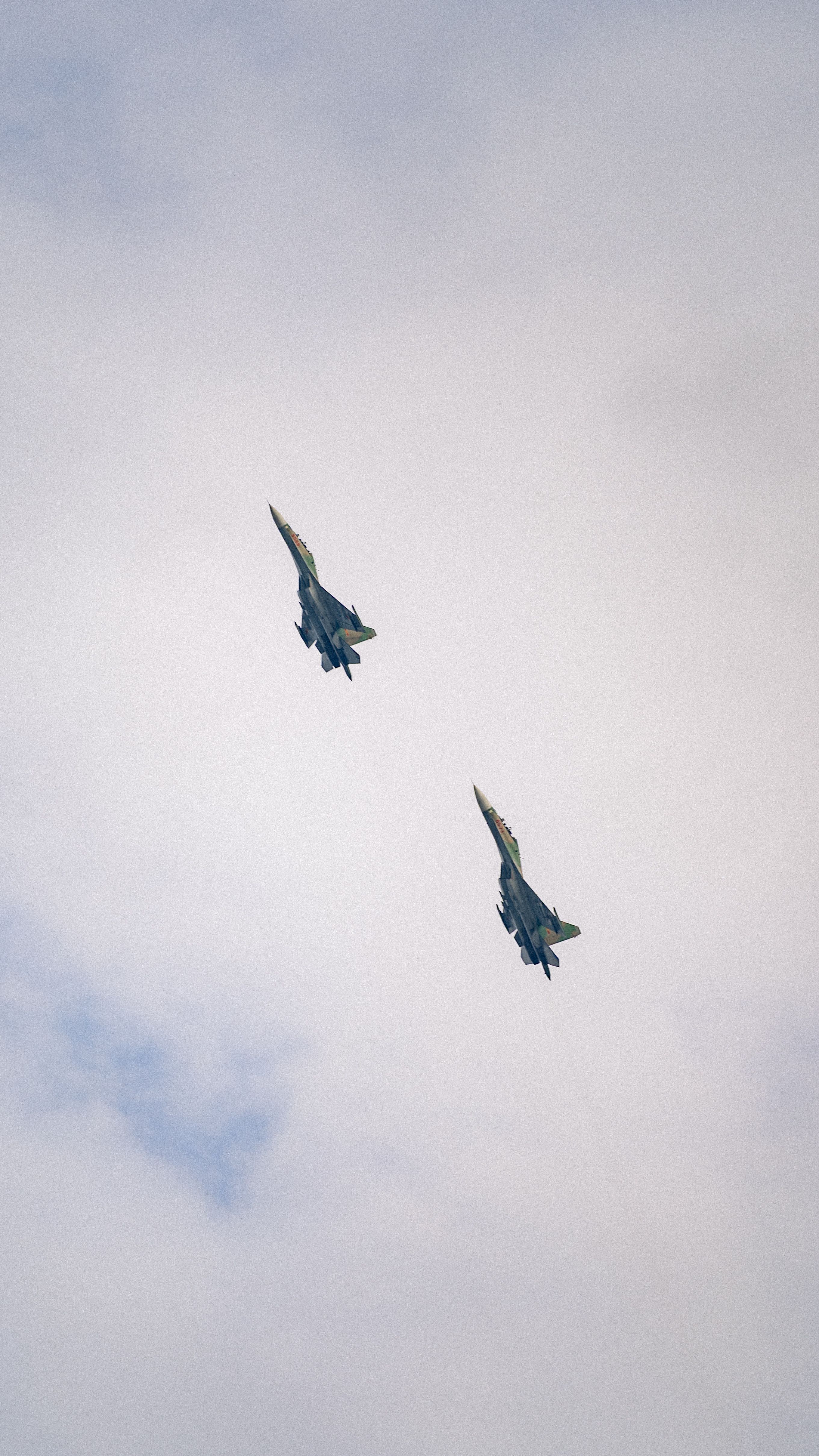 Military Jets Flying in Formation Against Cloudy Sky · Free Stock Photo