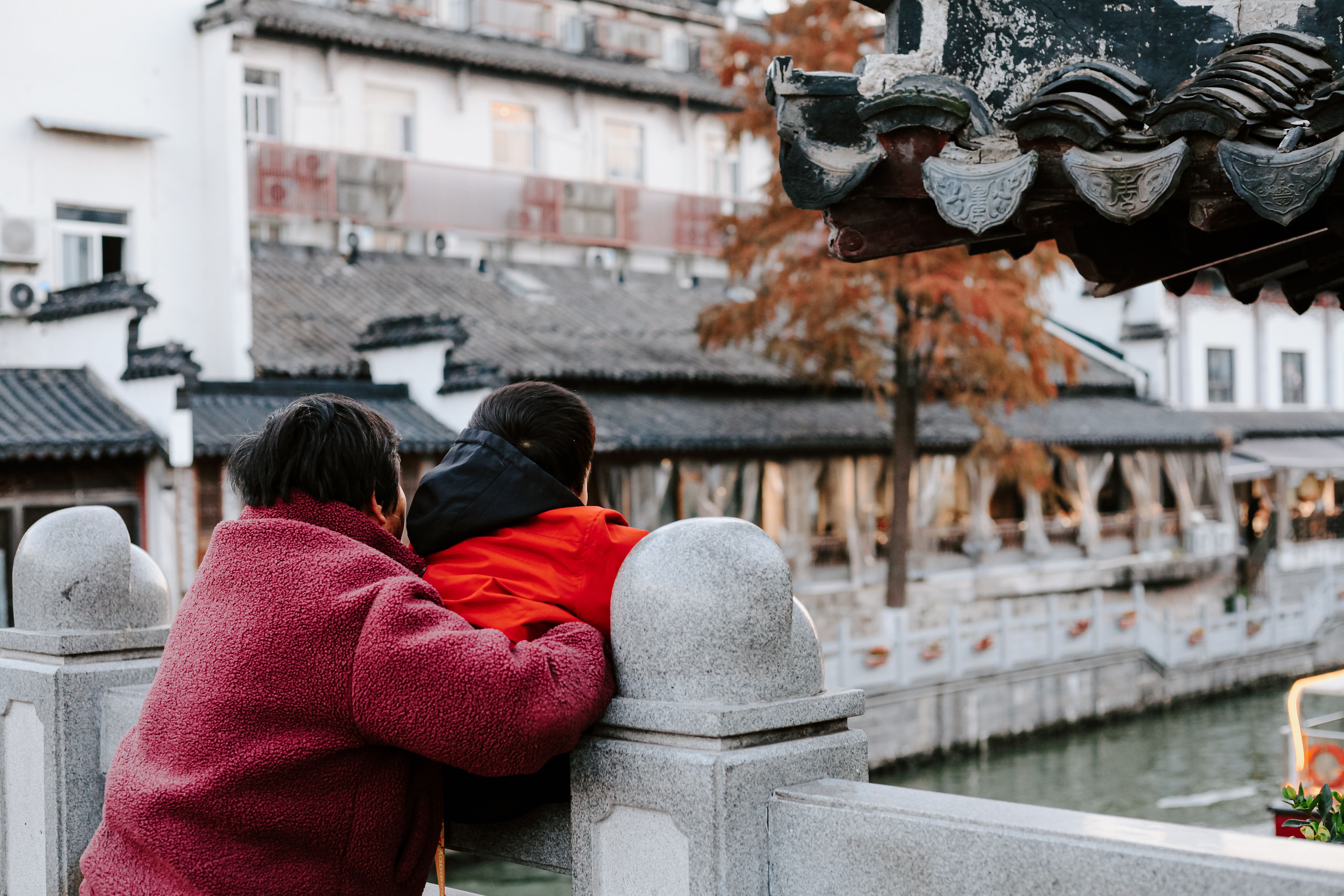 Family Observing Scenic Autumn Views in Nanjing · Free Stock Photo