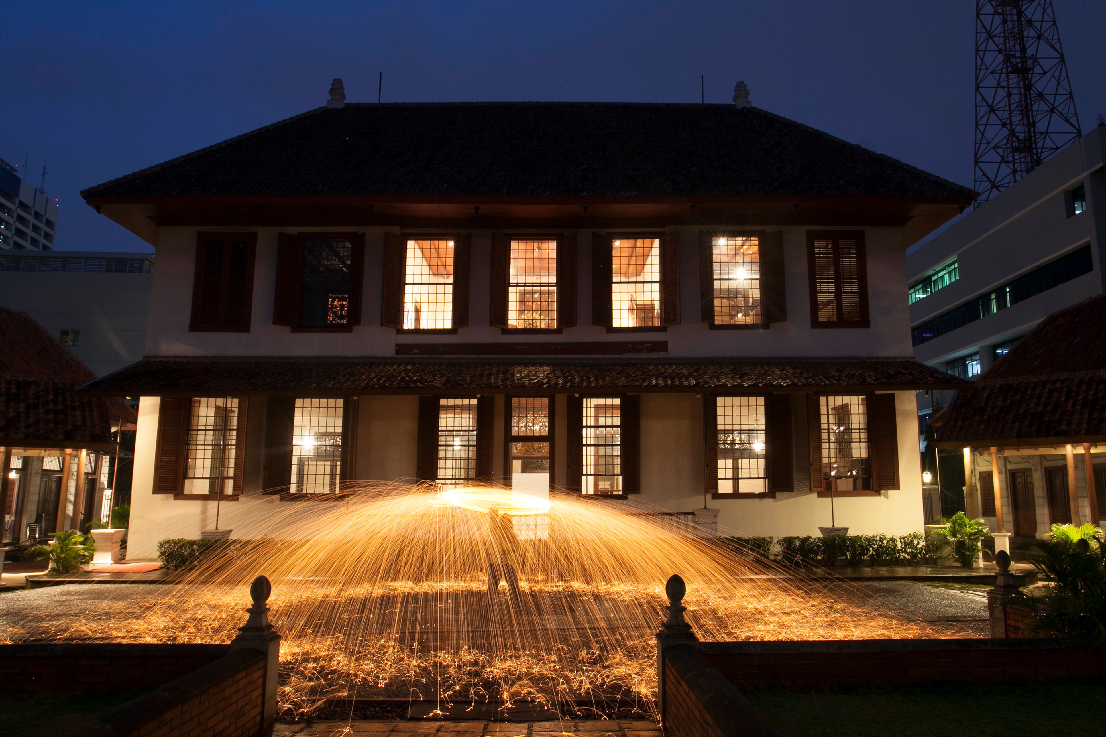 Illuminated Historic Building with Light Trails at Night · Free Stock Photo