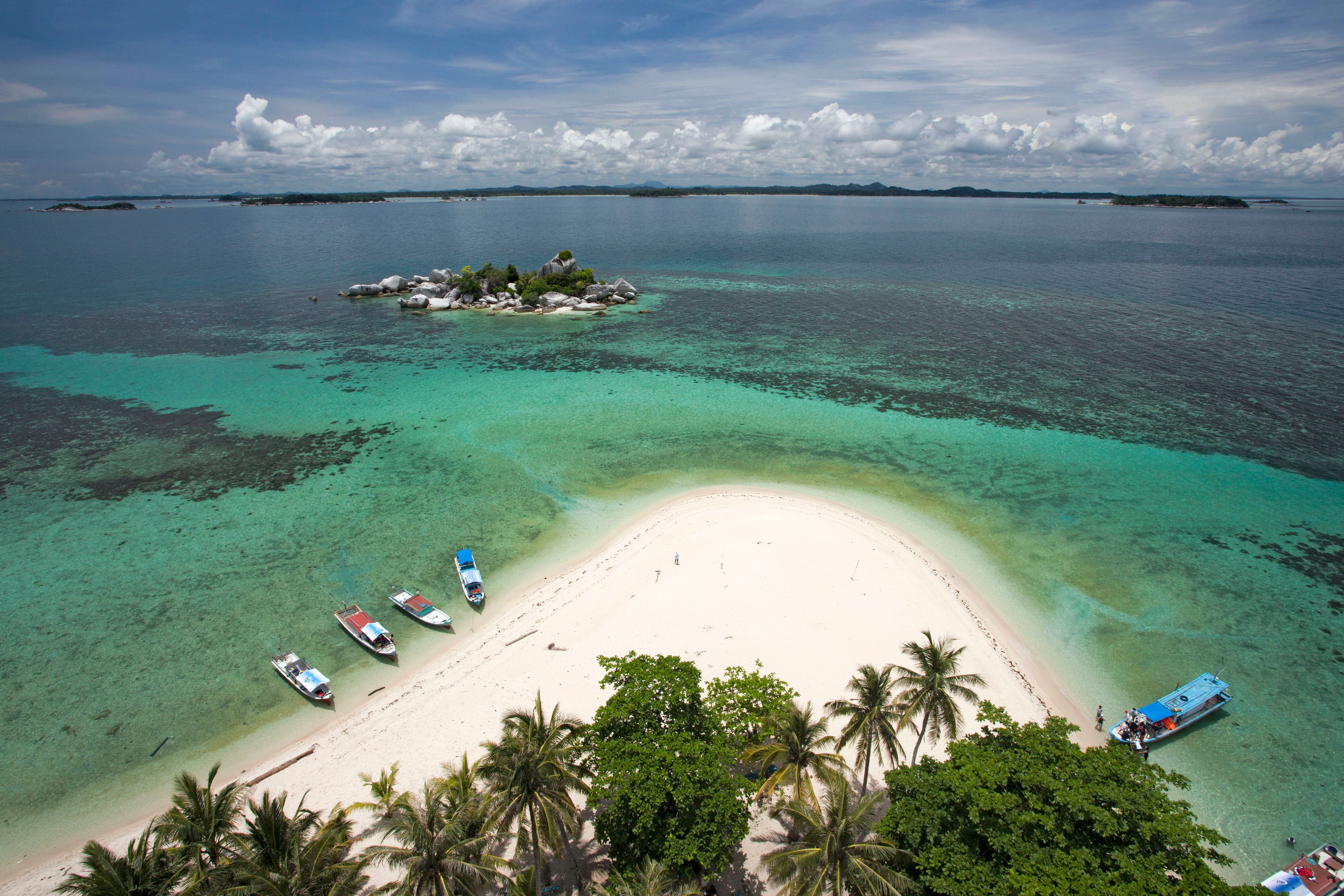 Aerial View of Tropical Island with Pristine Beach · Free Stock Photo