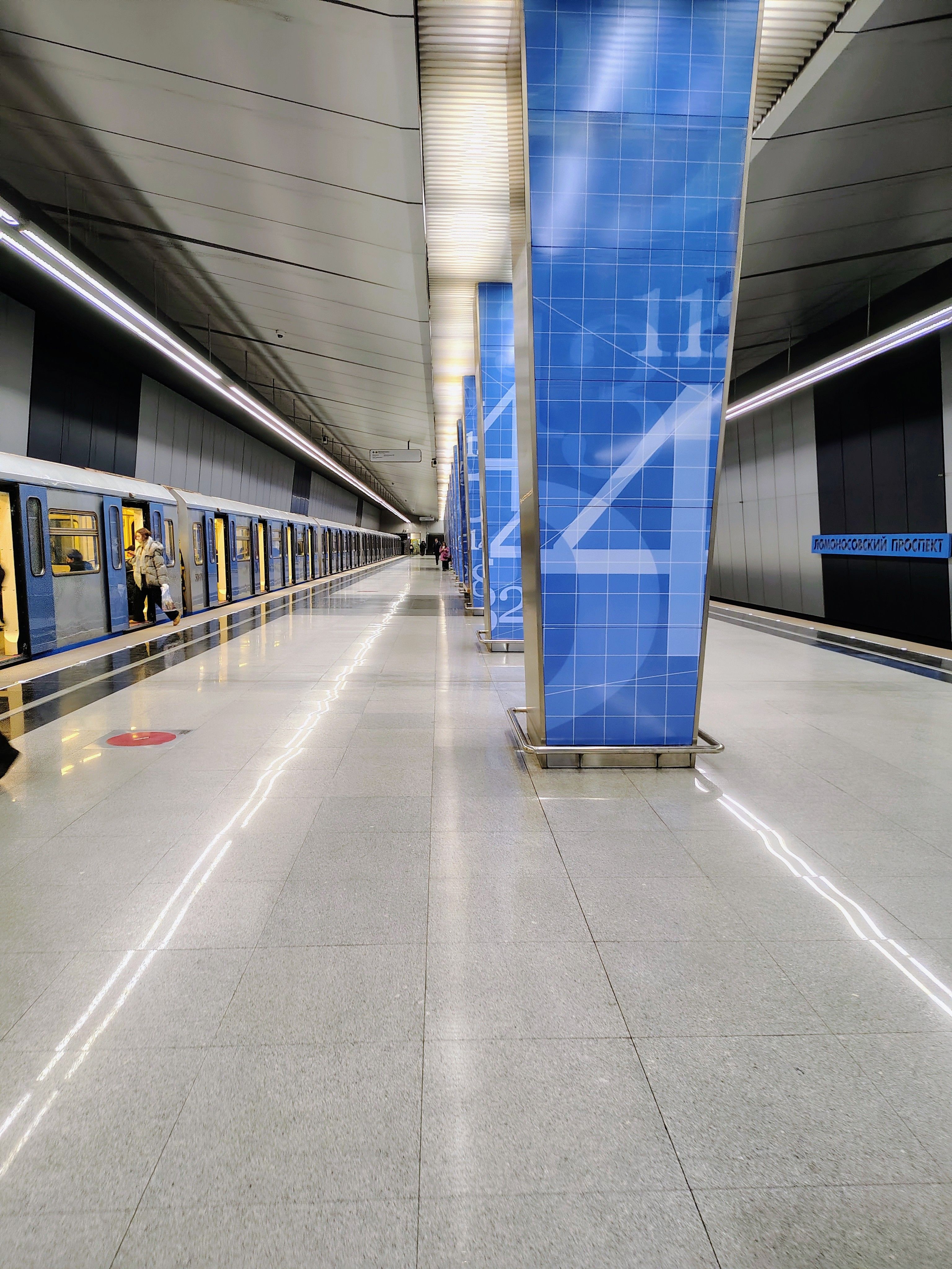 Modern Subway Station with Blue Columns · Free Stock Photo
