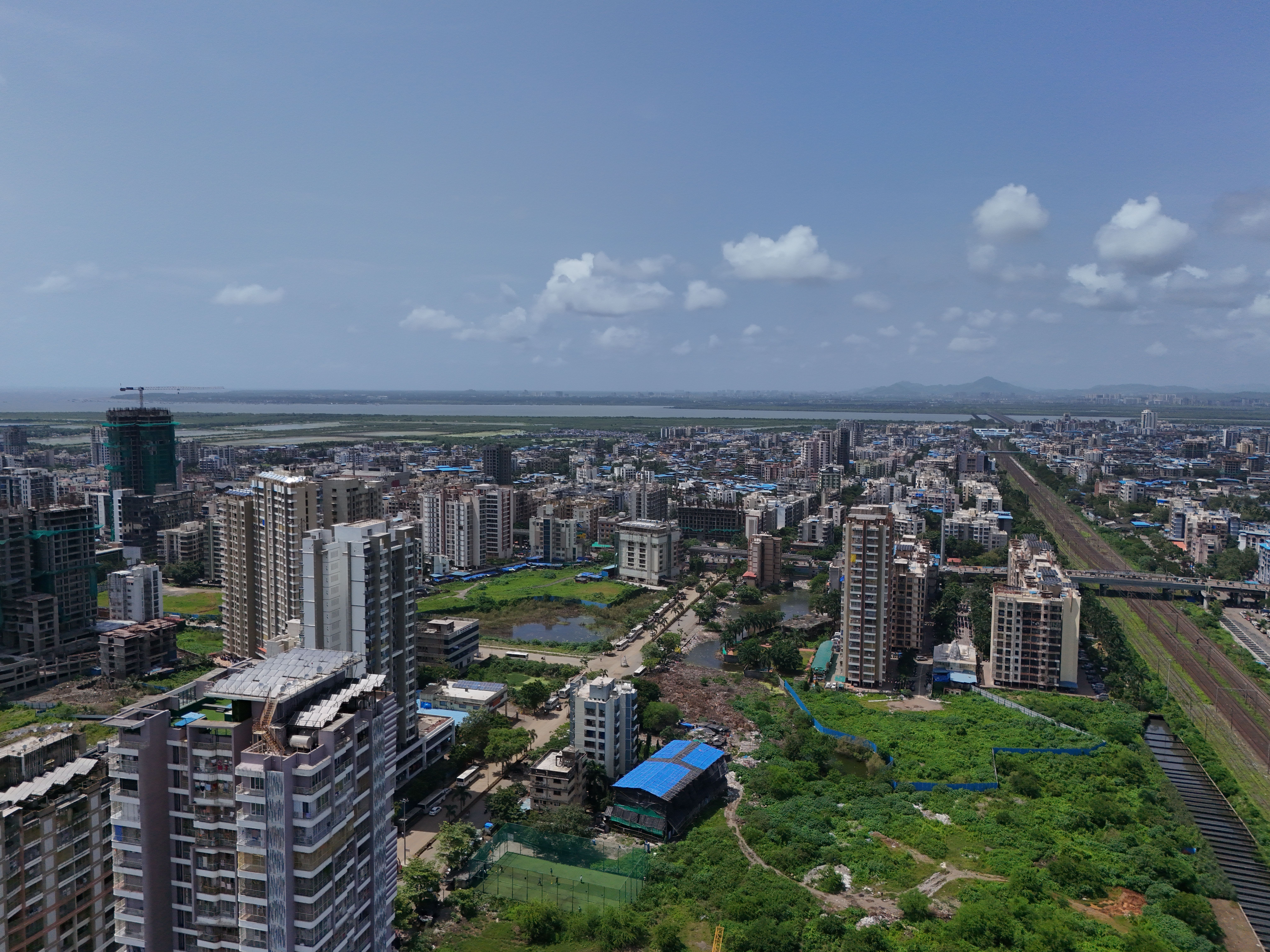 Aerial View of Mumbai Skyline with Coastal Background · Free Stock Photo