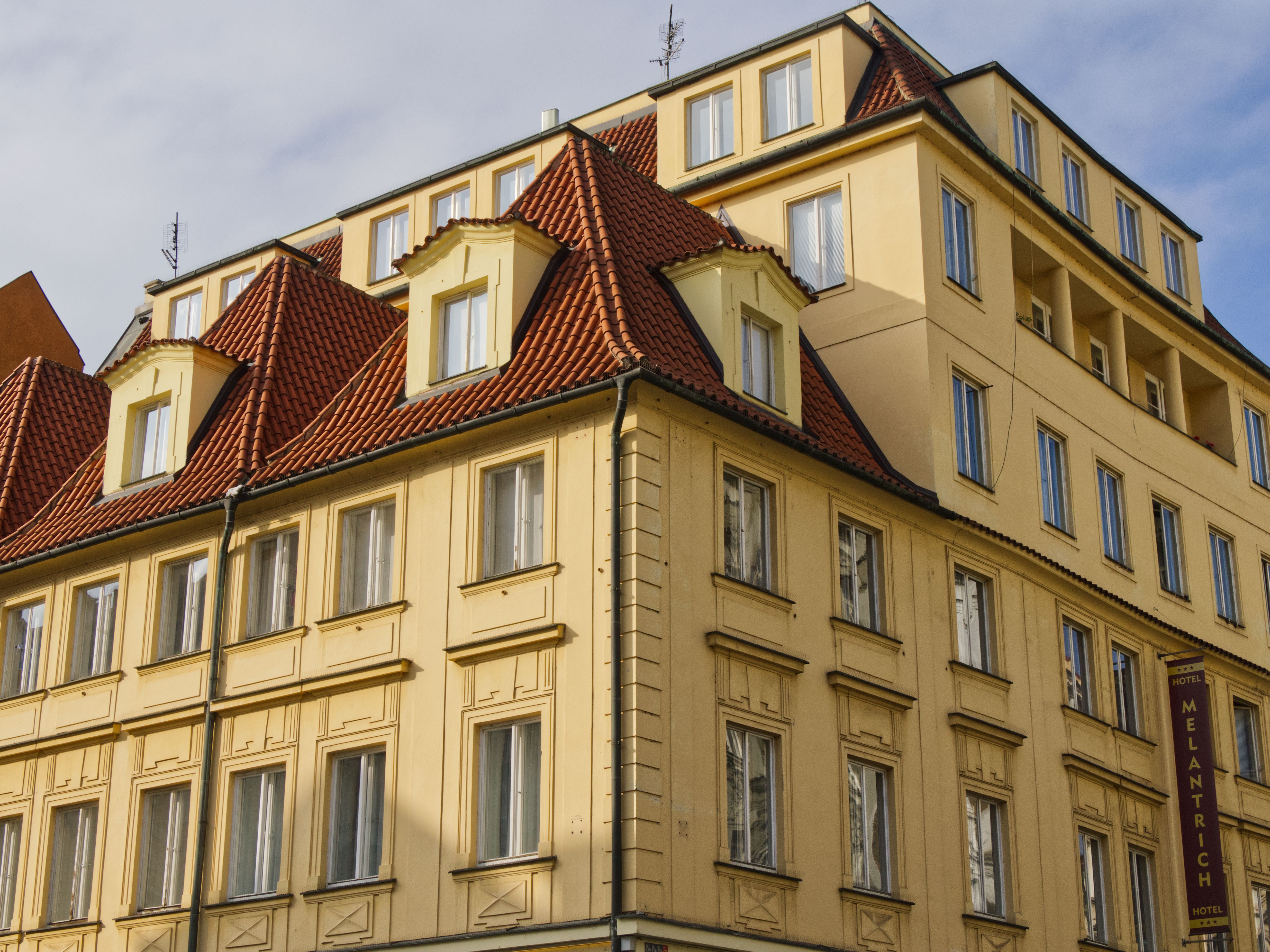 Historic European Building with Red Tile Roof · Free Stock Photo