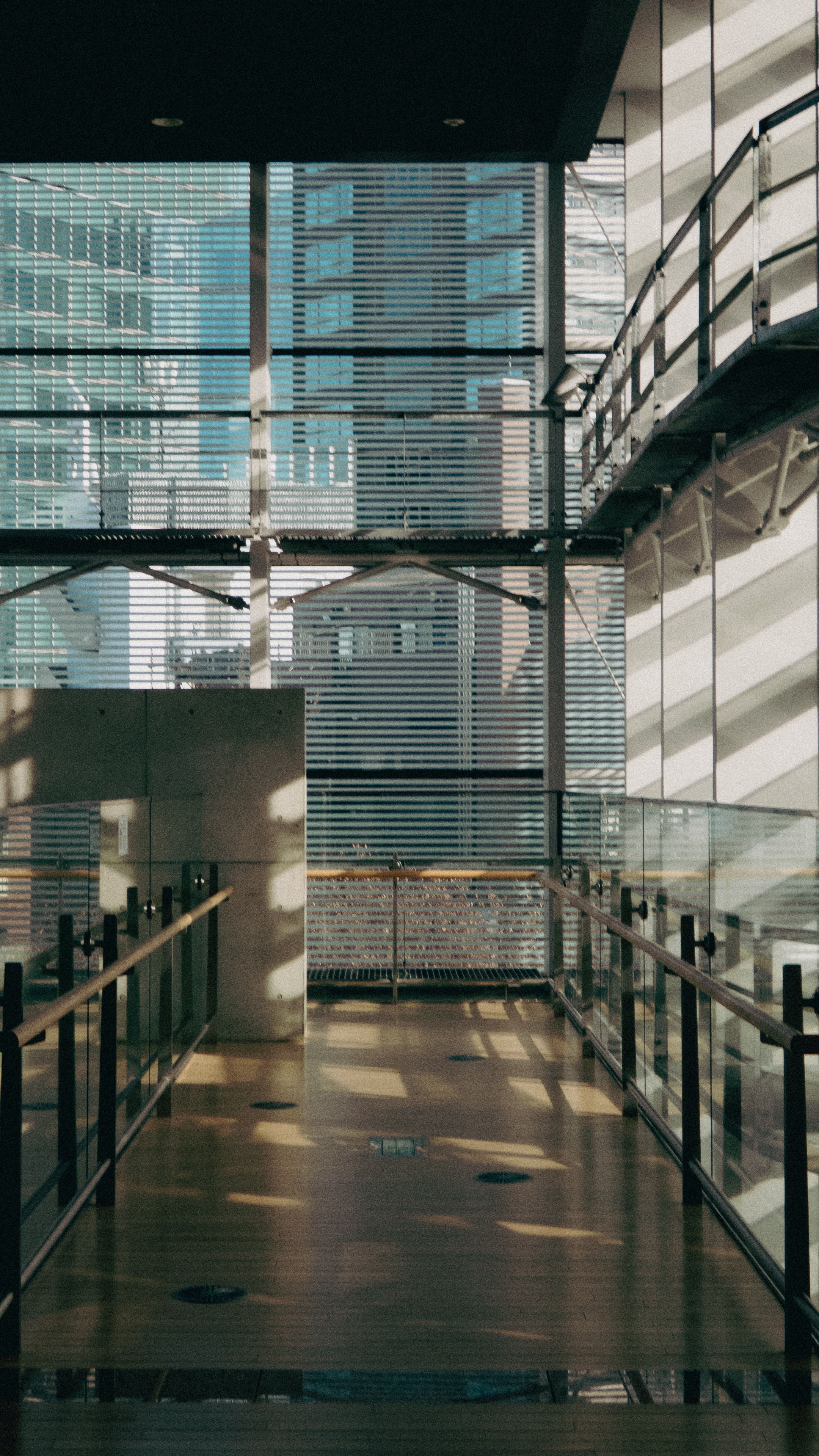 Modern Indoor Architecture with Sunlit Walkway · Free Stock Photo