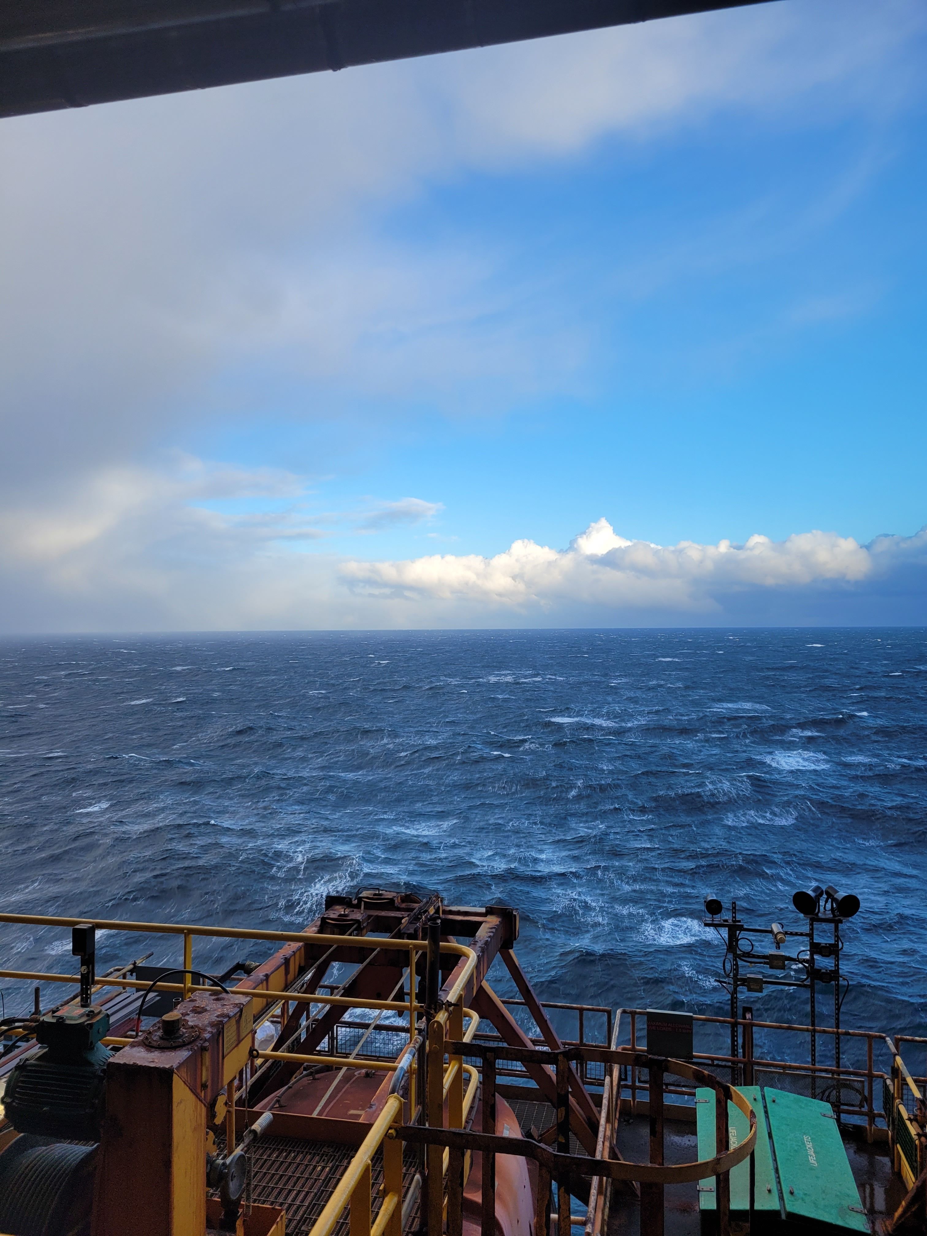 Offshore Oil Rig Overlooking Ocean Horizon · Free Stock Photo