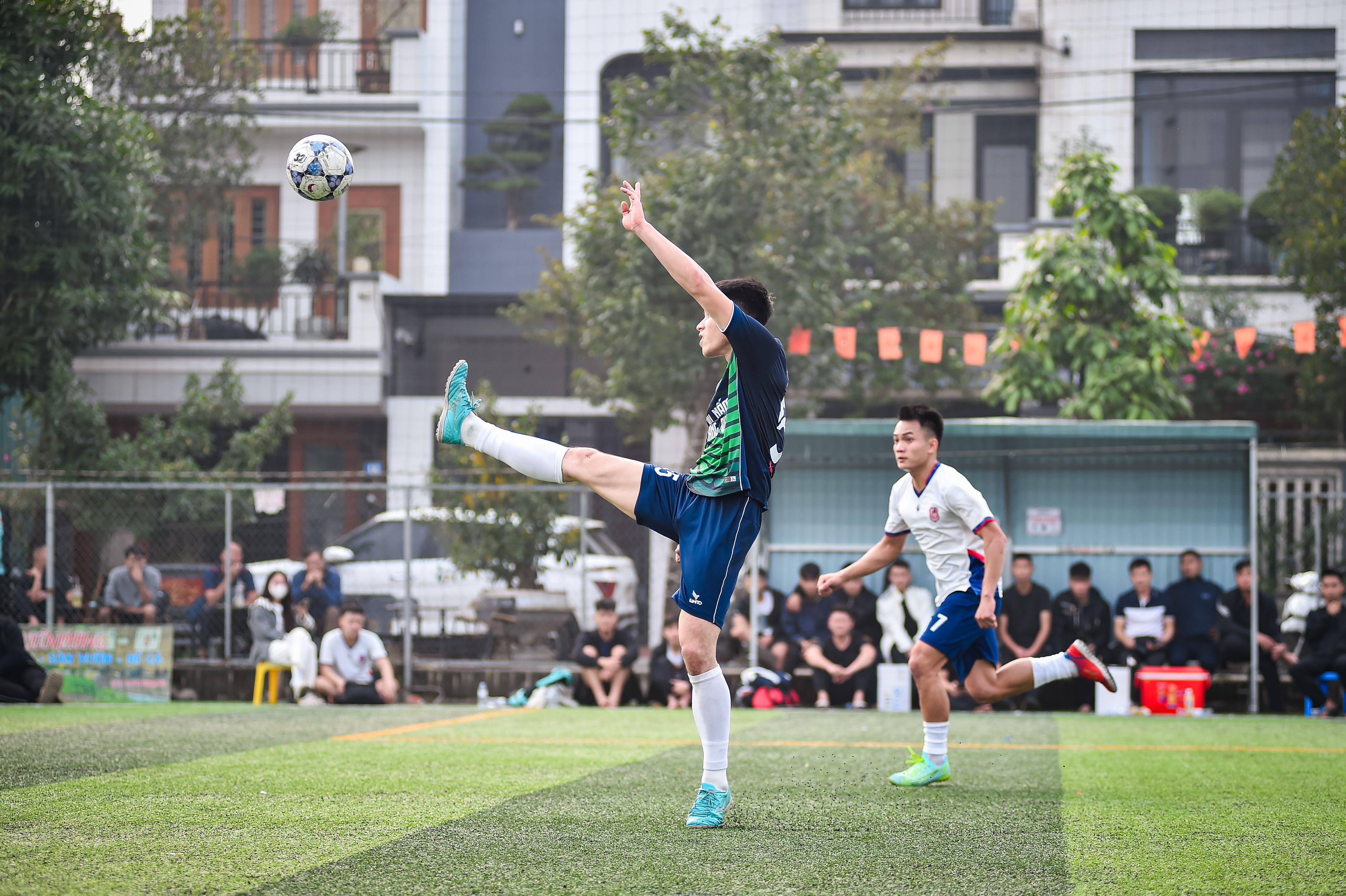 Dynamic Football Match Action in Hanoi · Free Stock Photo