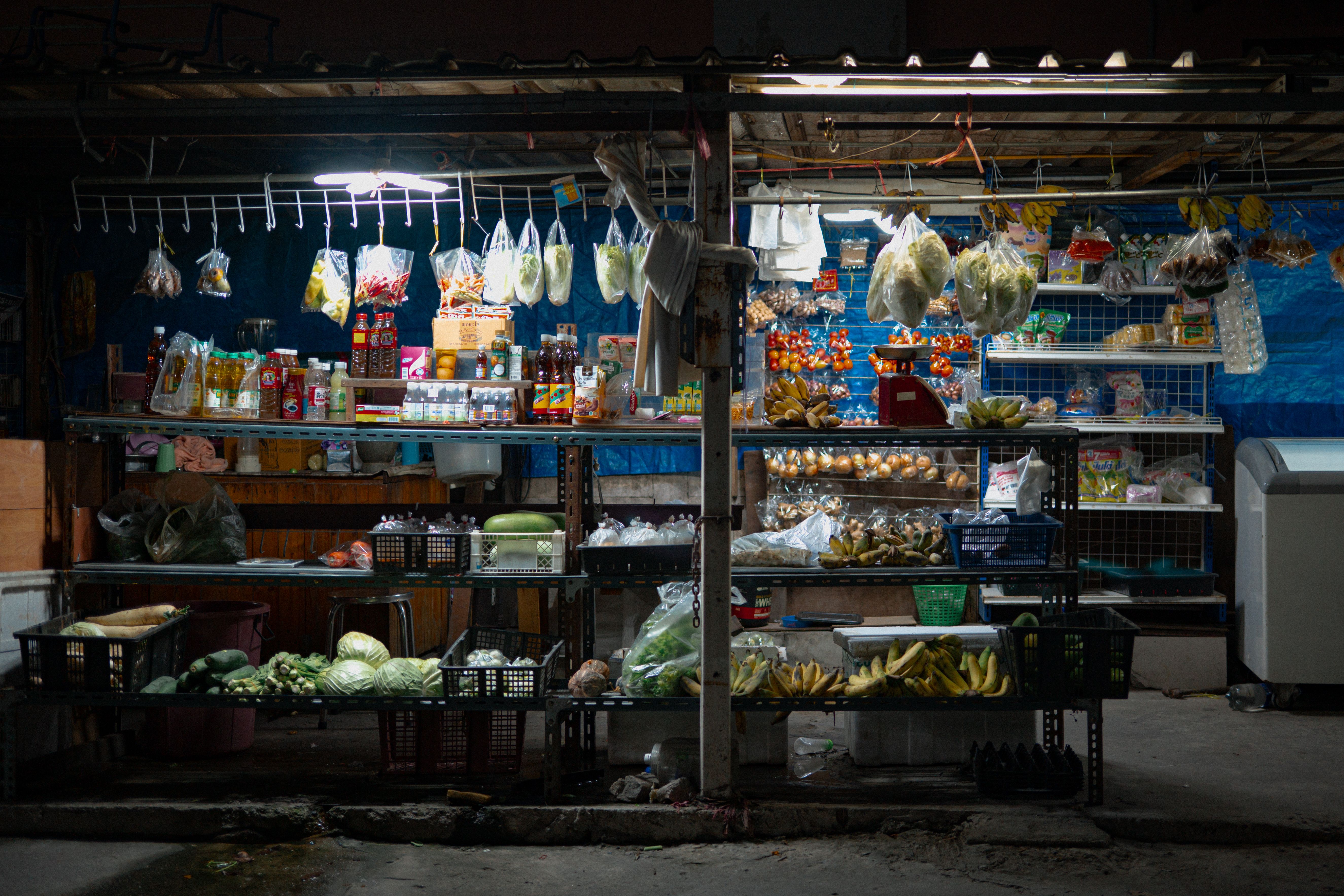 Vibrant Night Market Stall in Bangkok, Thailand · Free Stock Photo