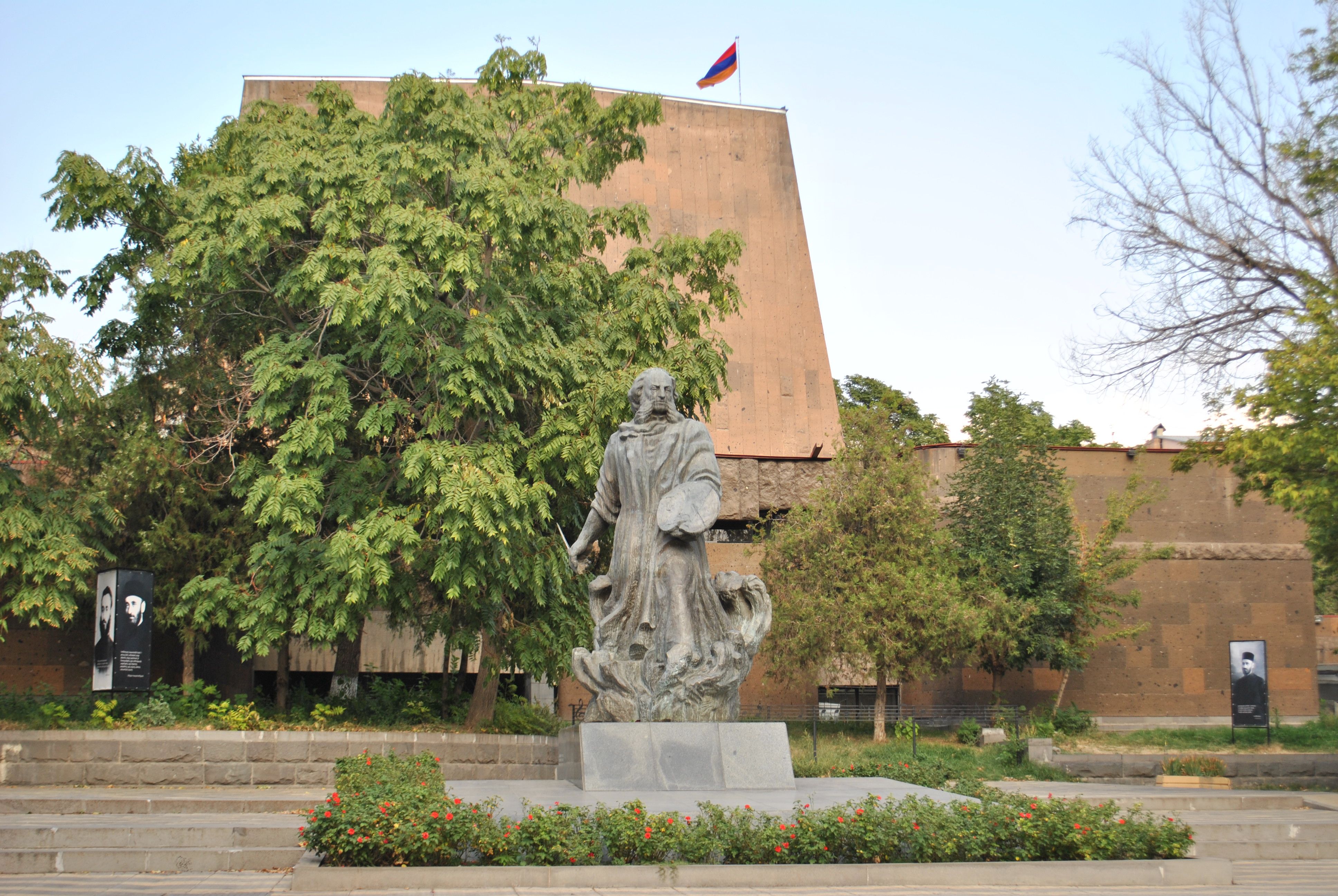 Statue in Yerevan against Historic Building · Free Stock Photo