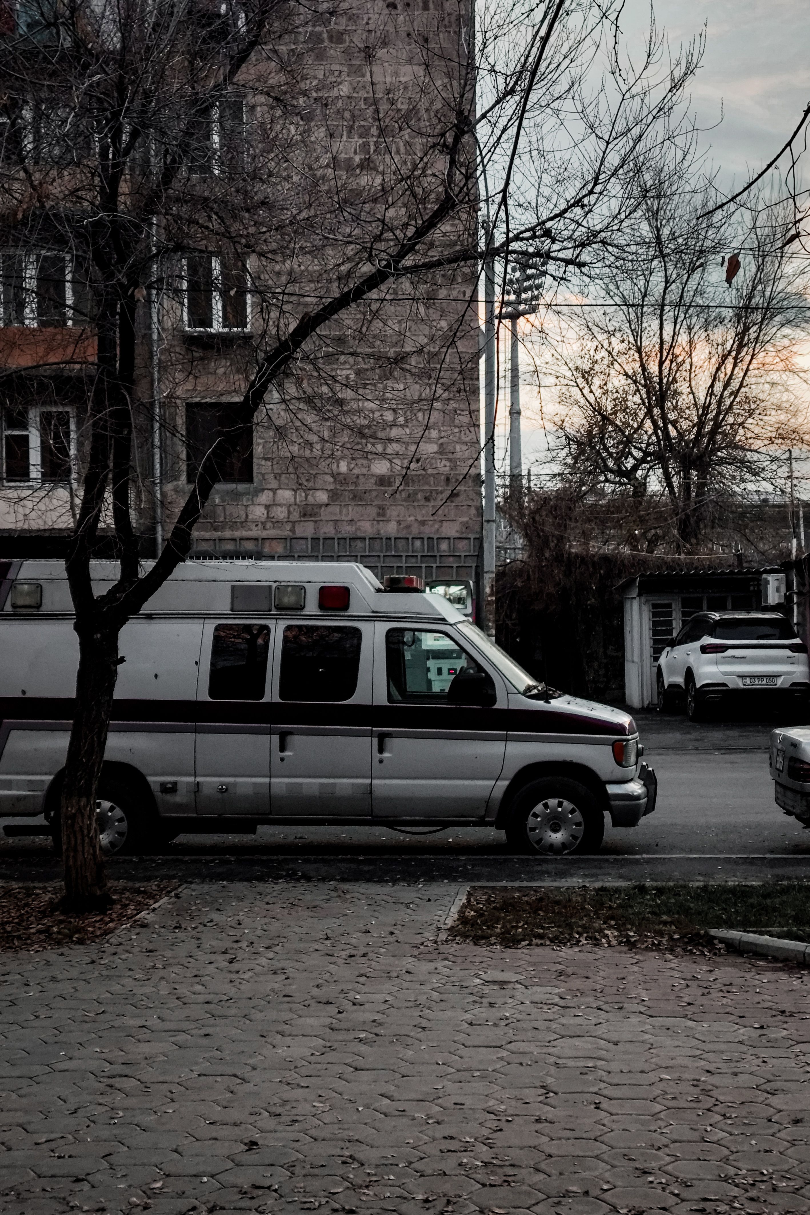 Moody Street Scene with Ambulance in Yerevan · Free Stock Photo