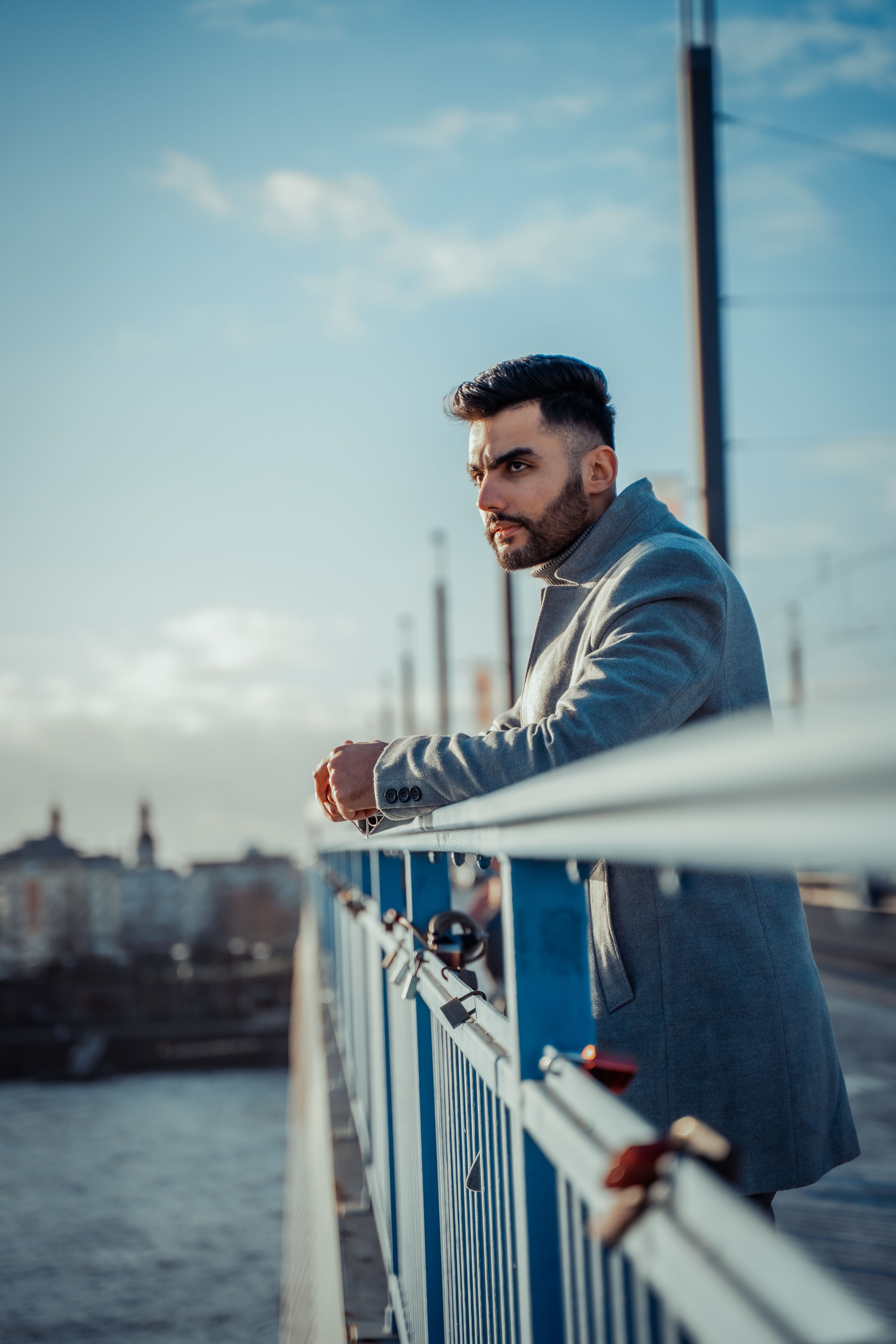 Stylish Man on Bridge in Bonn During Daytime · Free Stock Photo