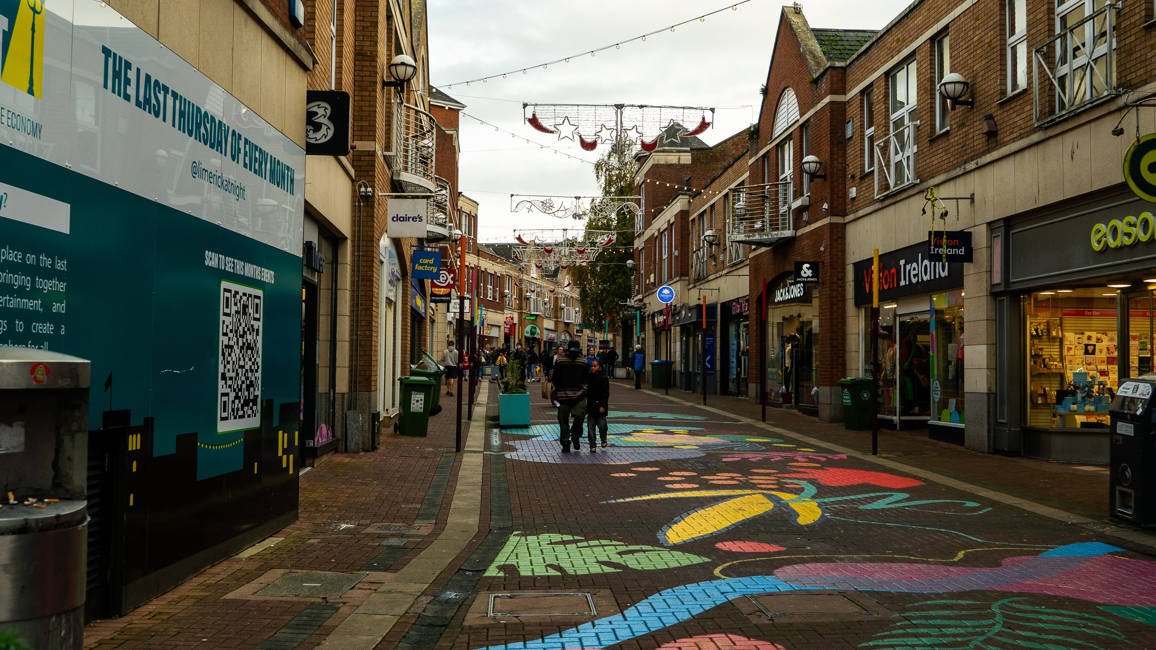 Colorful Urban Street with Vibrant Painted Pathway · Free Stock Photo