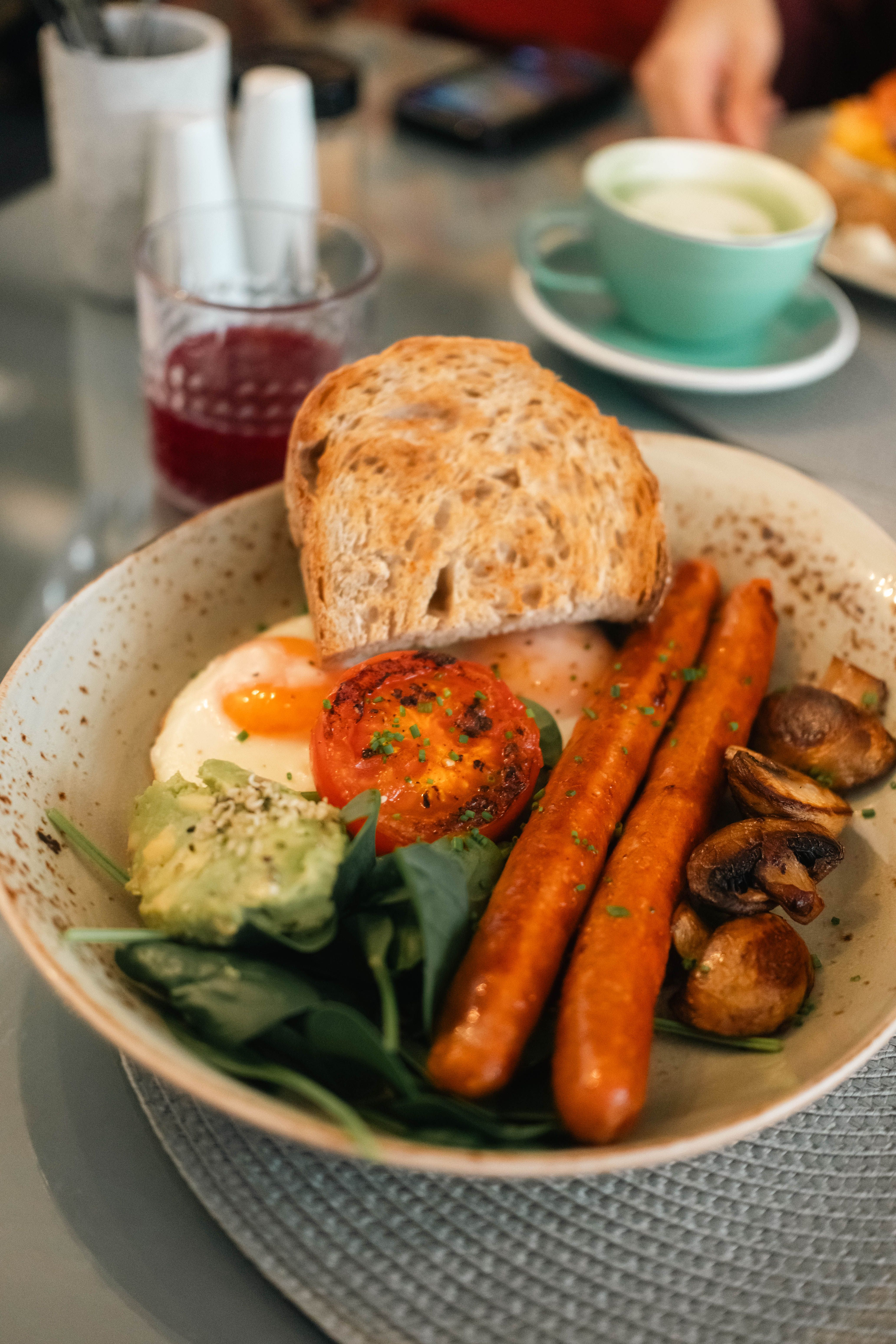 Hearty English Breakfast with Sausages and Avocado · Free Stock Photo