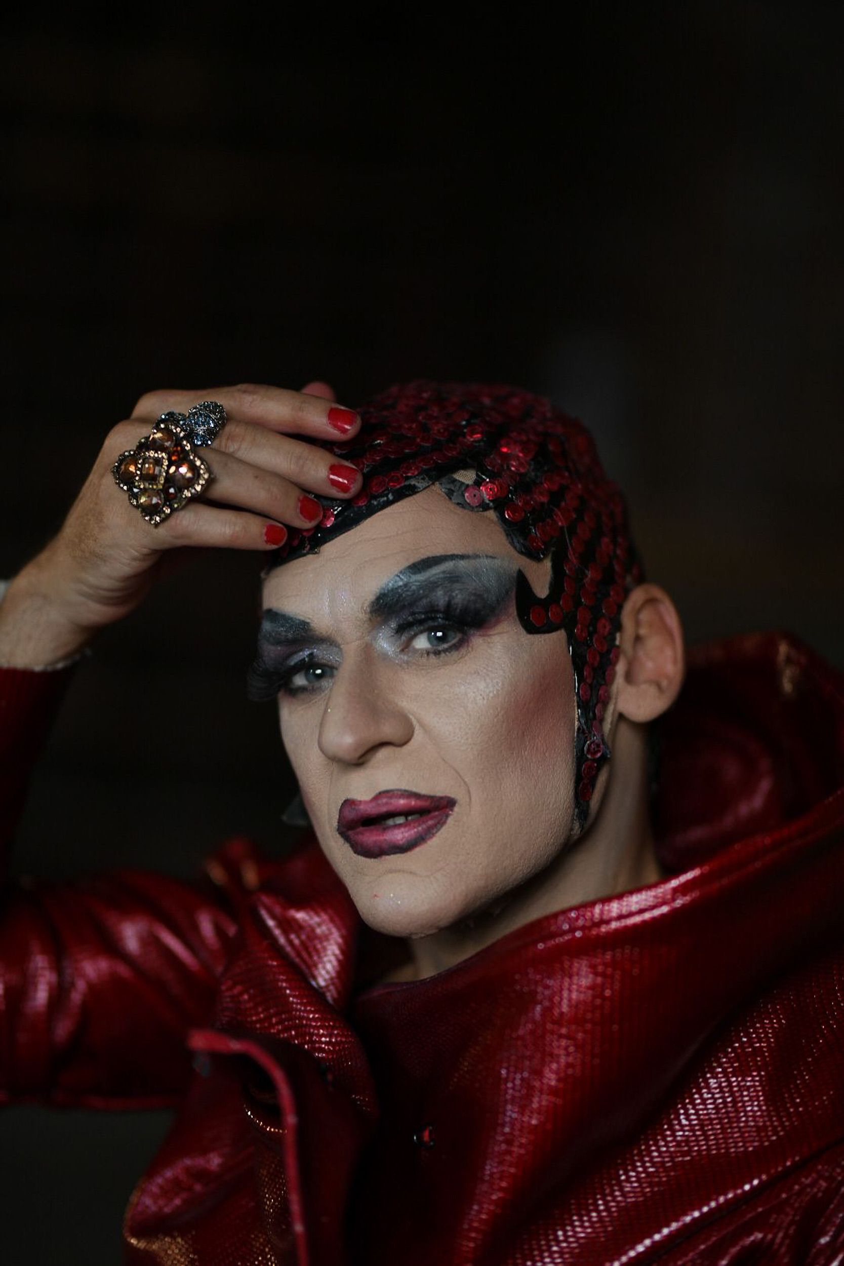 Striking Drag Portrait in Bold Red Costume · Free Stock Photo