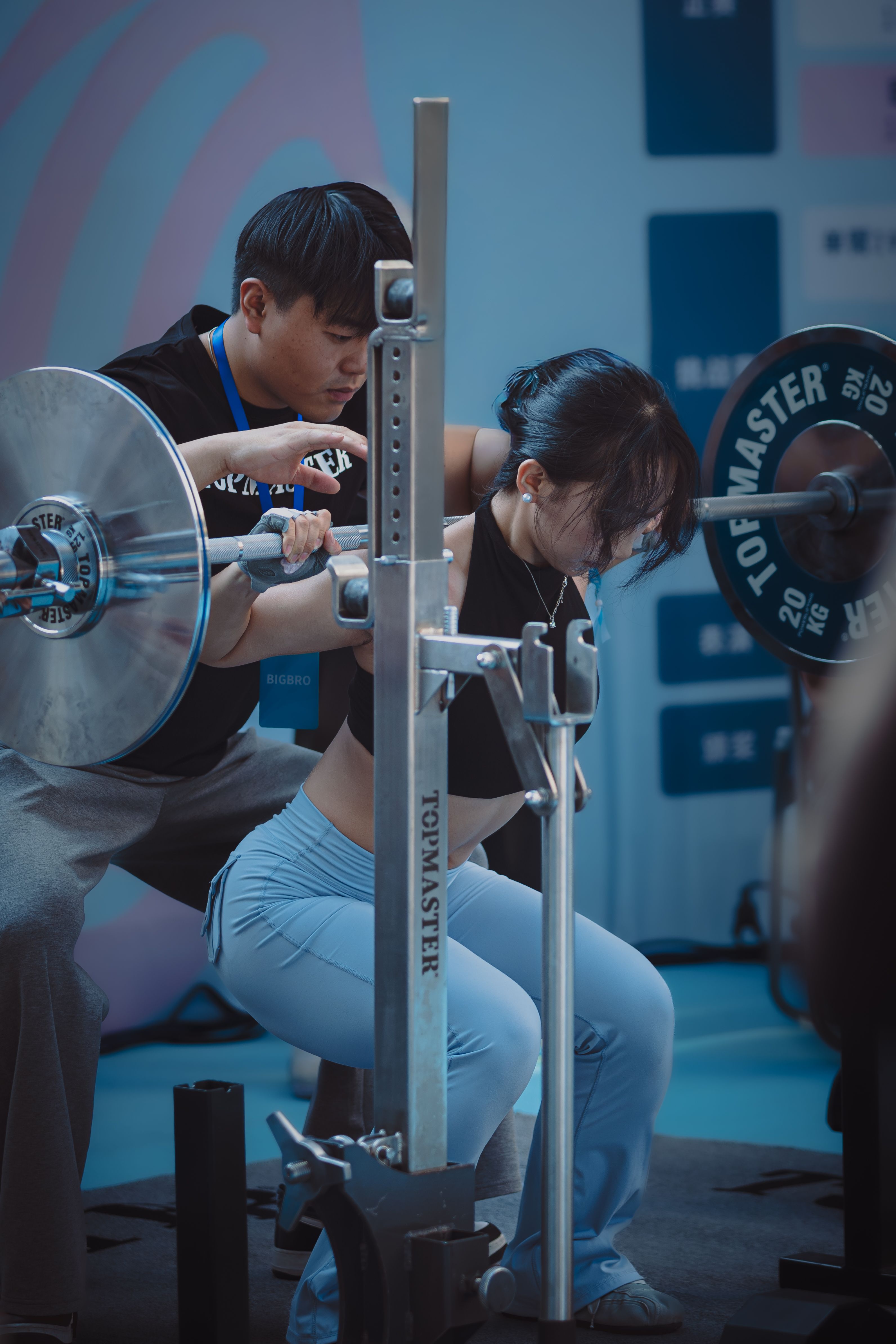 Woman Powerlifting with Trainer Support · Free Stock Photo
