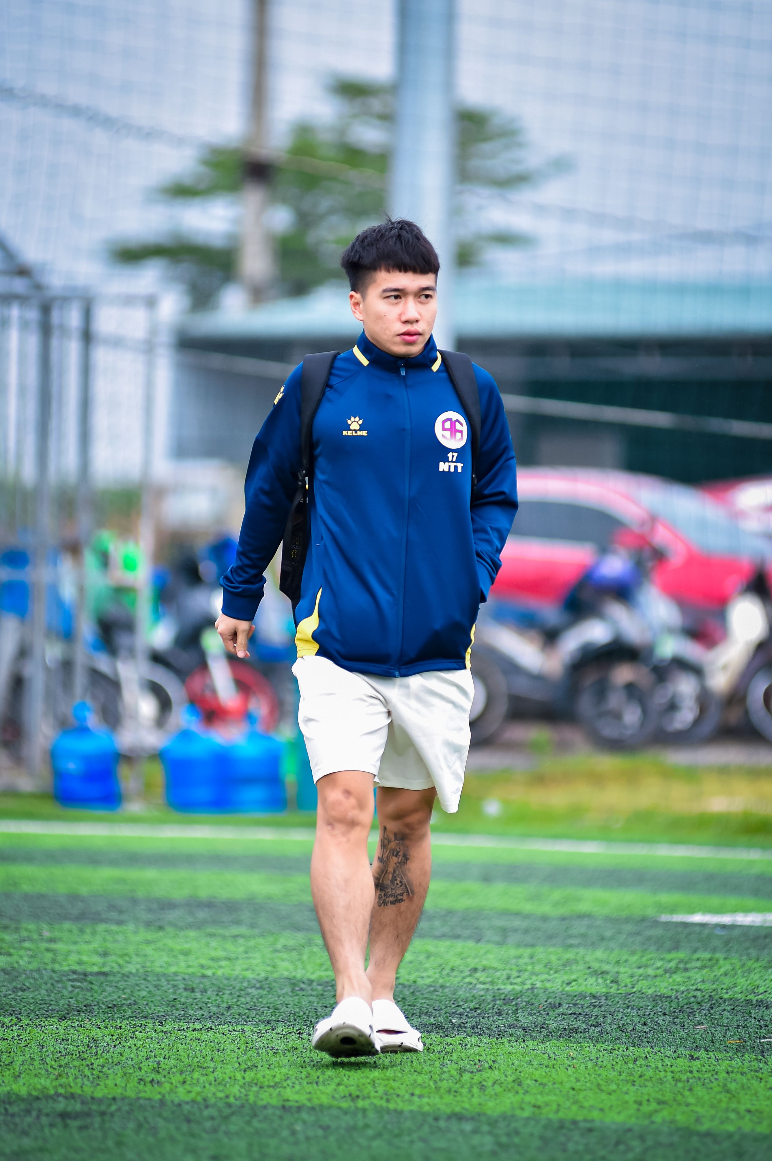 Young Footballer on Artificial Turf Field · Free Stock Photo