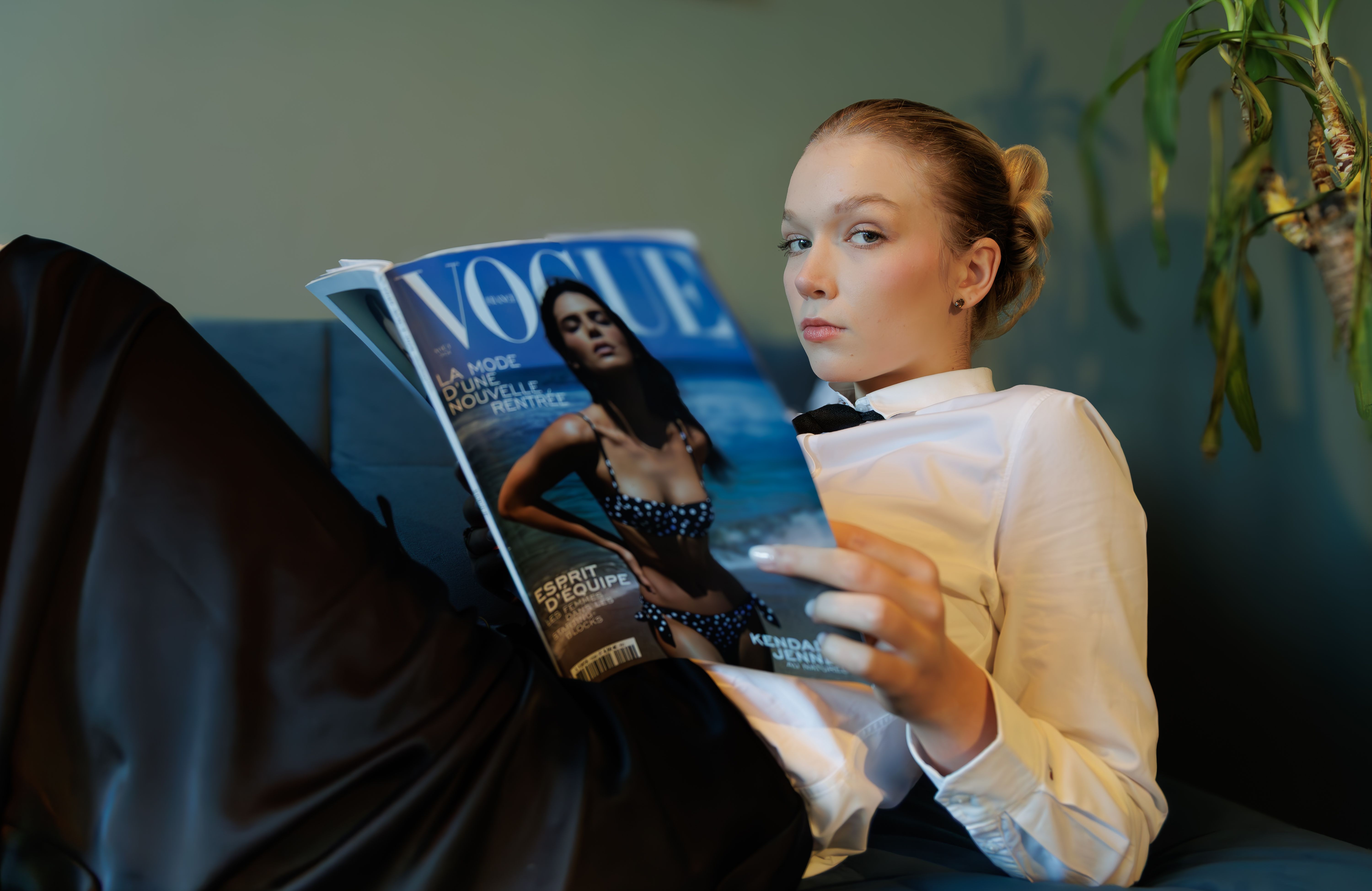 Woman Relaxing with Fashion Magazine Indoors · Free Stock Photo