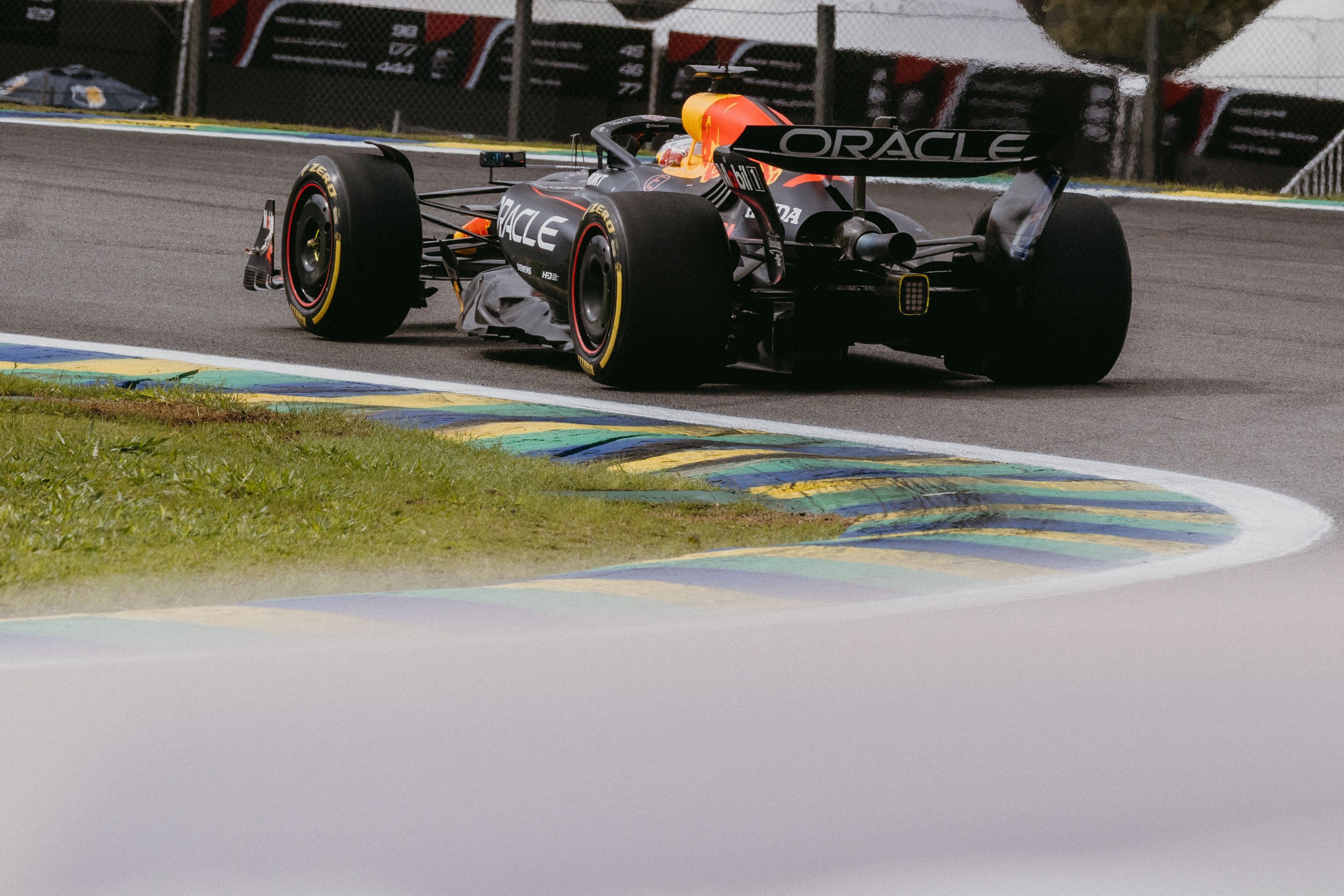 High-Speed Formula 1 Car at São Paulo Race Track · Free Stock Photo