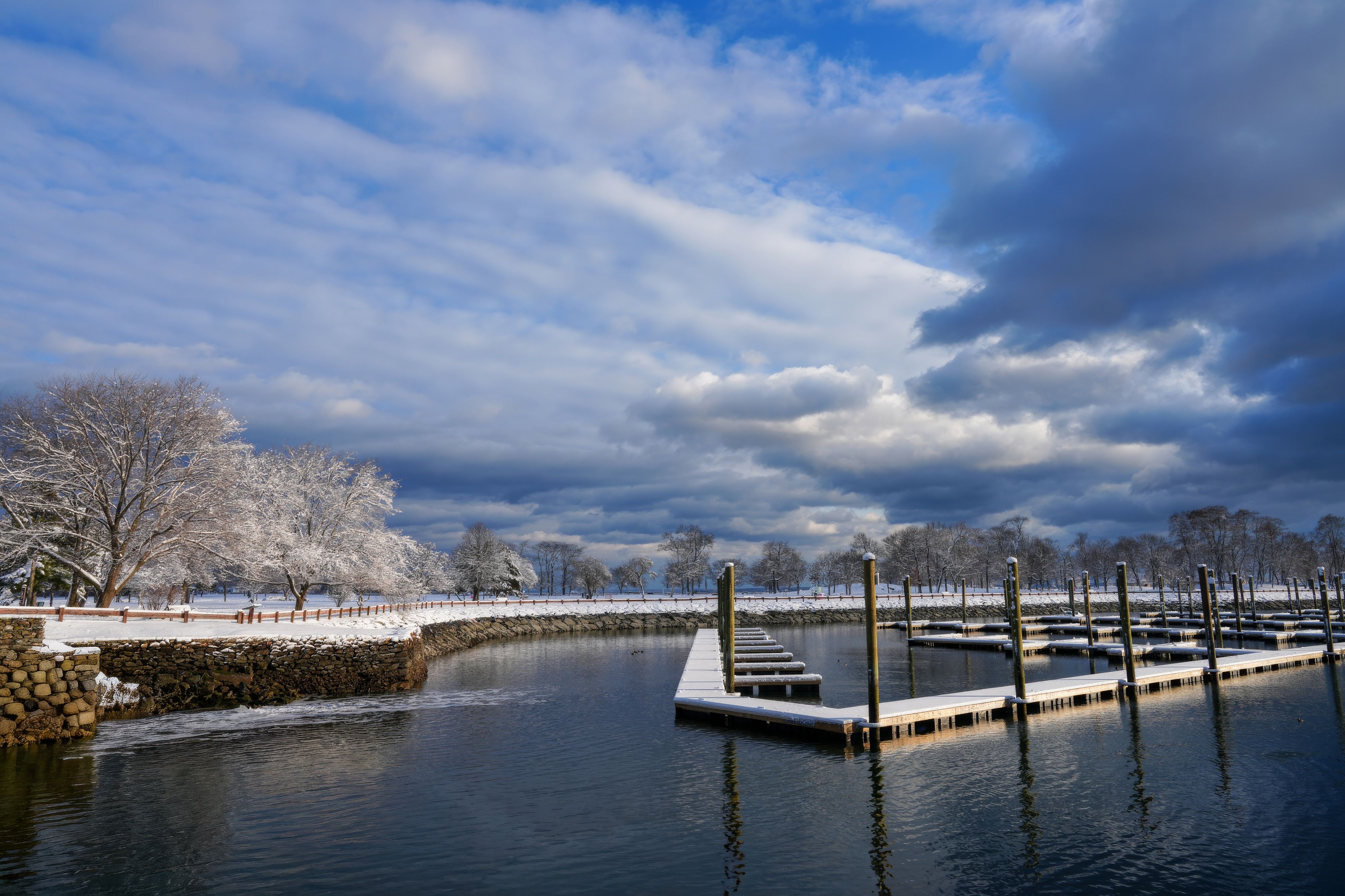 Snowy Marina in Winter with Dramatic Clouds · Free Stock Photo