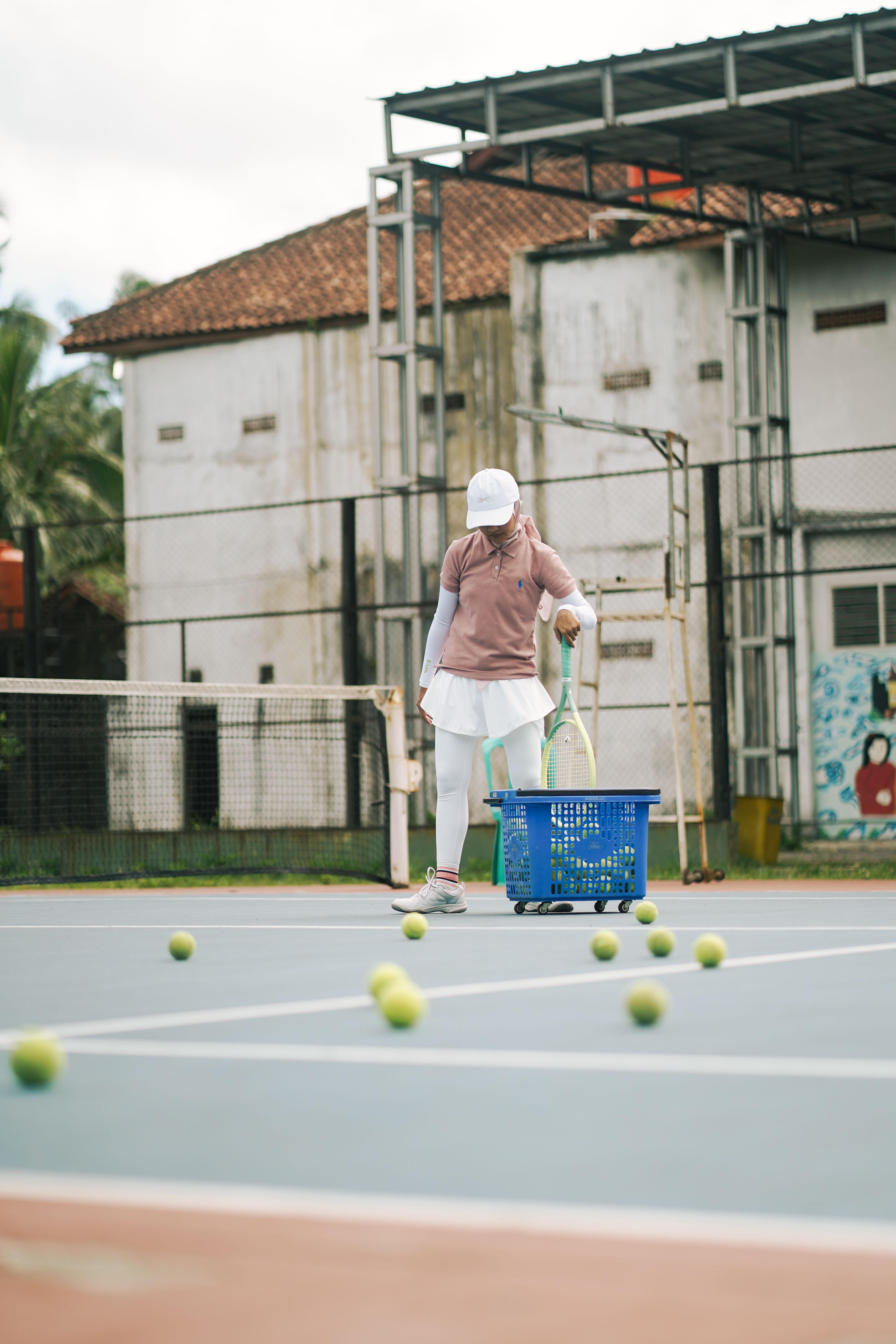 Tennis Player Practicing on Outdoor Court · Free Stock Photo