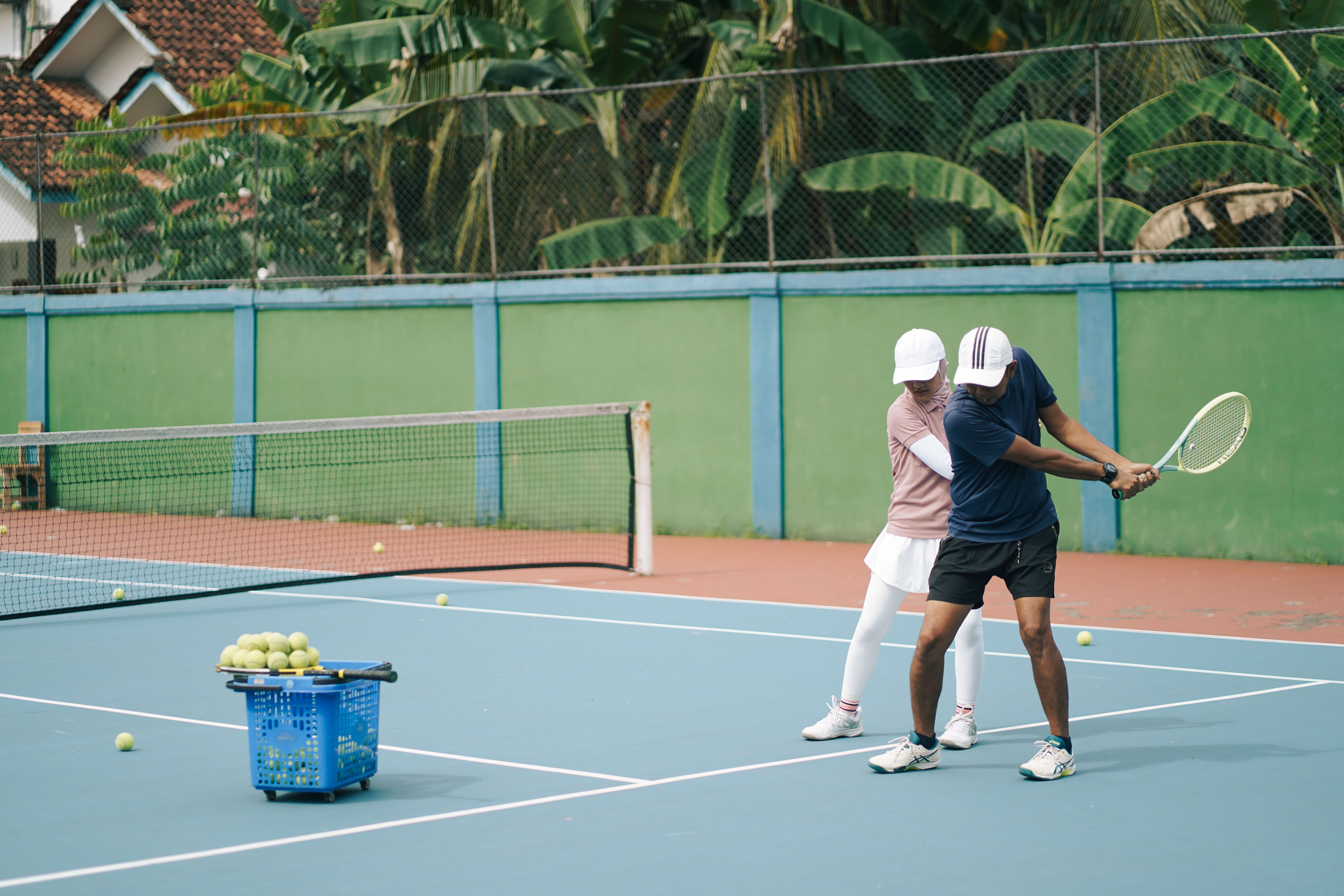 Tennis Coaching Lesson on Outdoor Court · Free Stock Photo