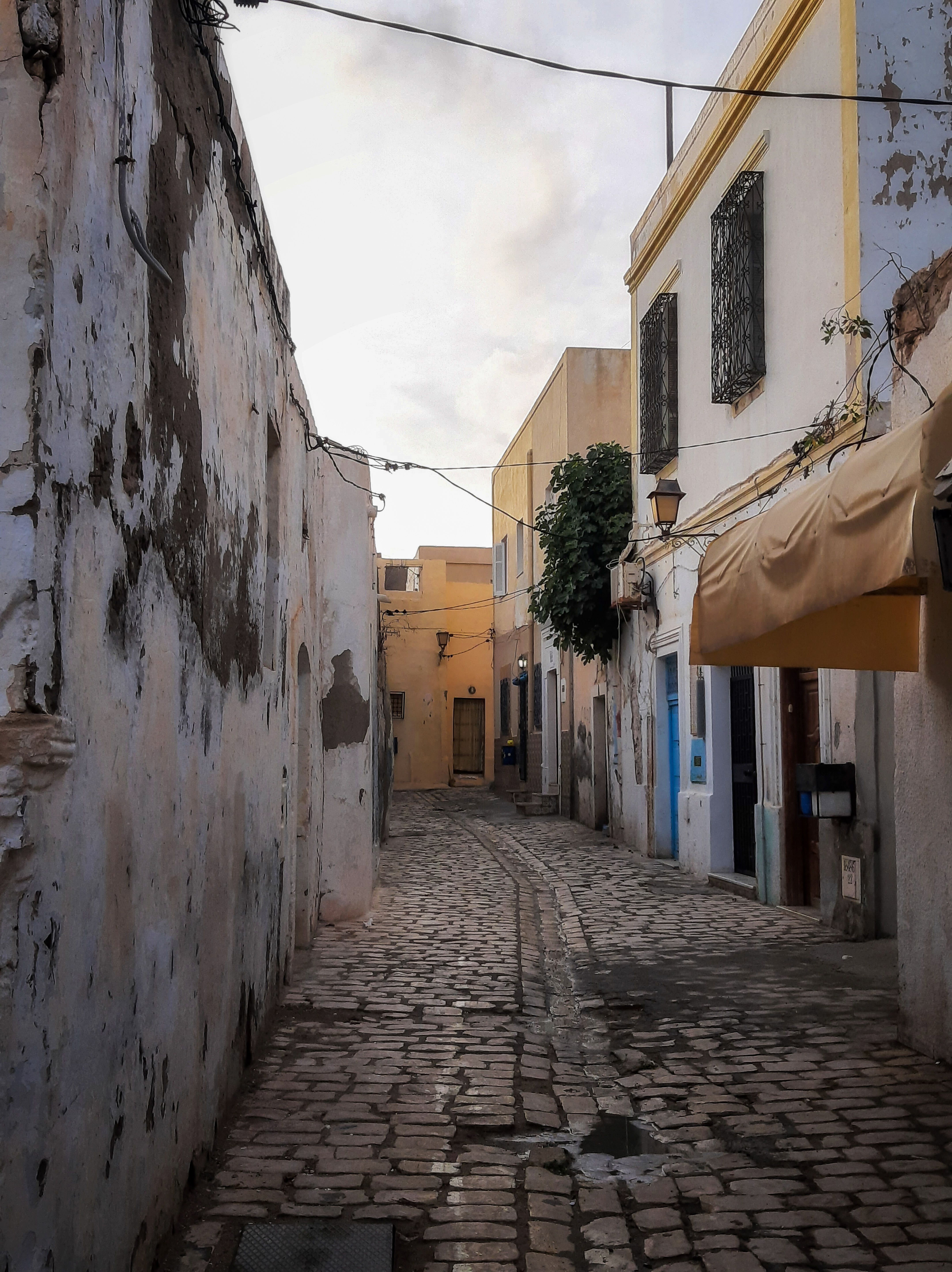 Charming Old Town Stone Pathway · Free Stock Photo