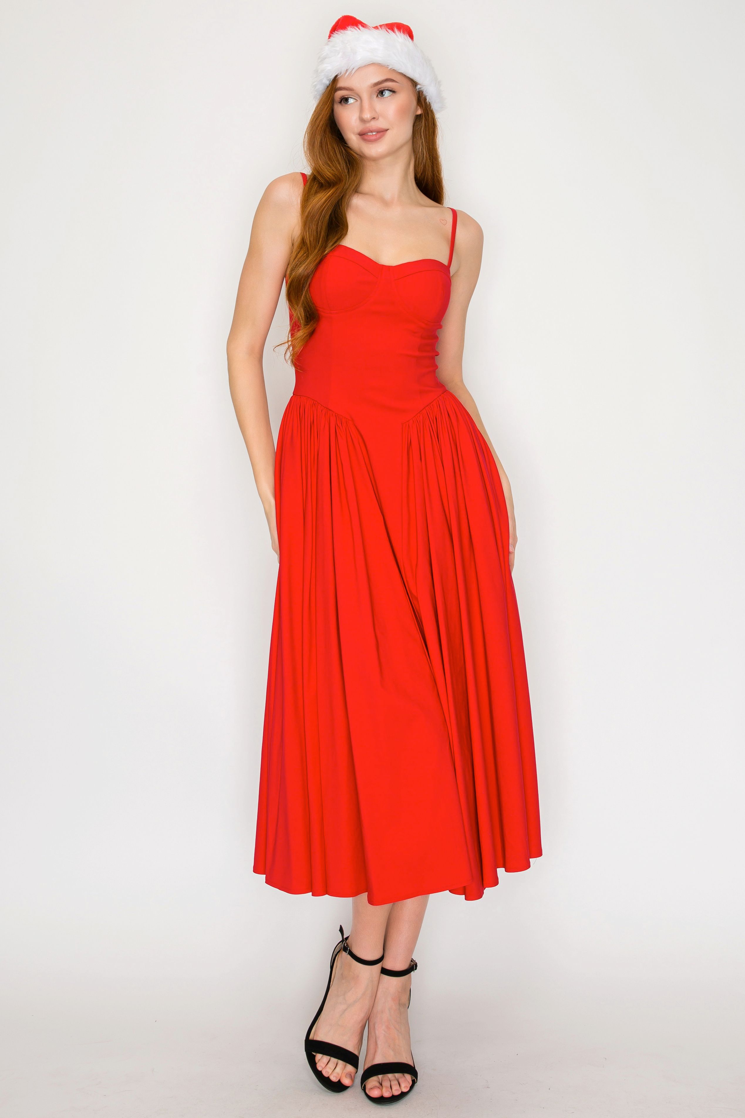Festive Woman in Red Dress with Santa Hat · Free Stock Photo