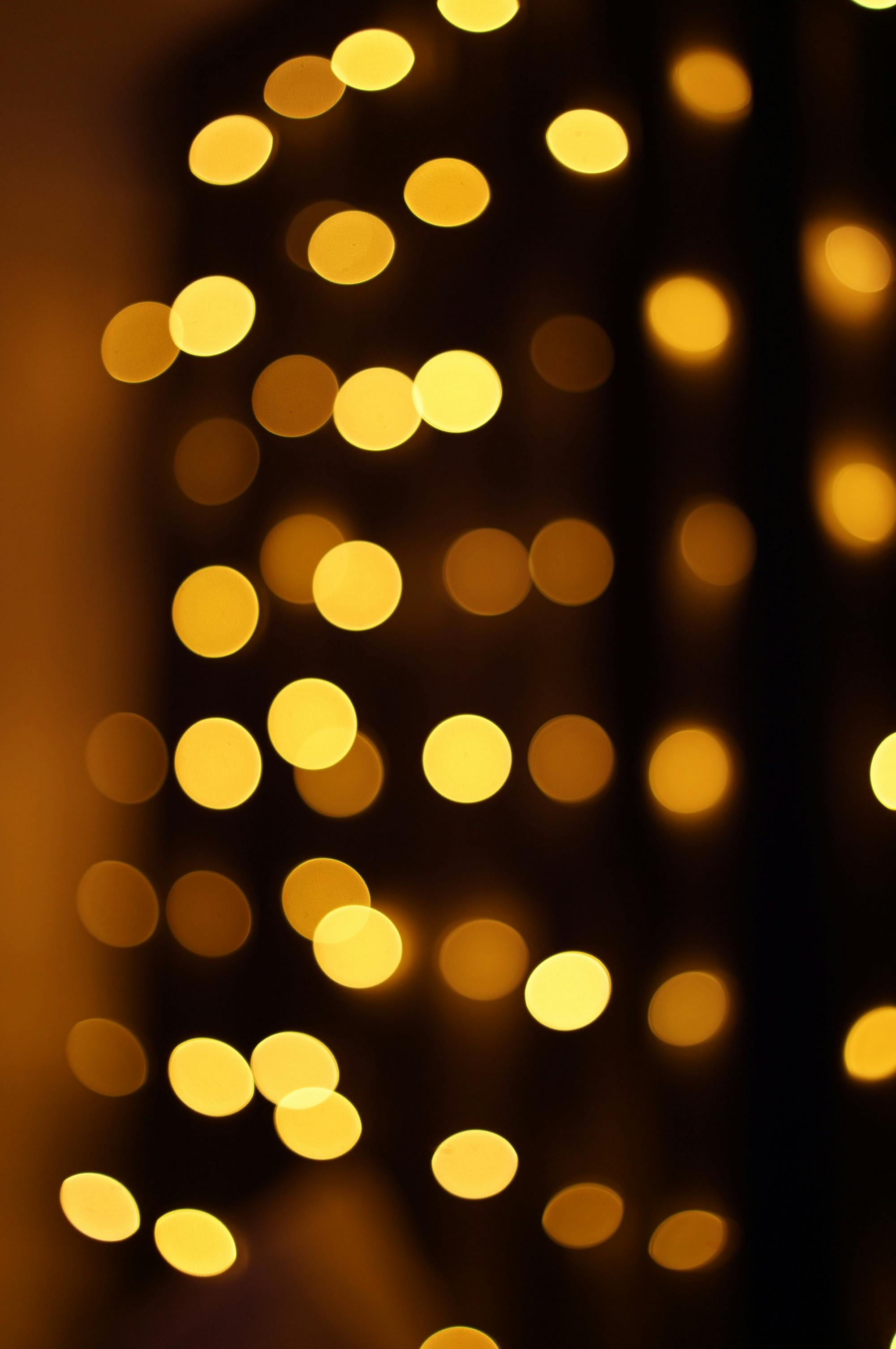 Warm Golden Bokeh Light Patterns Elegantly Captured · Free Stock Photo