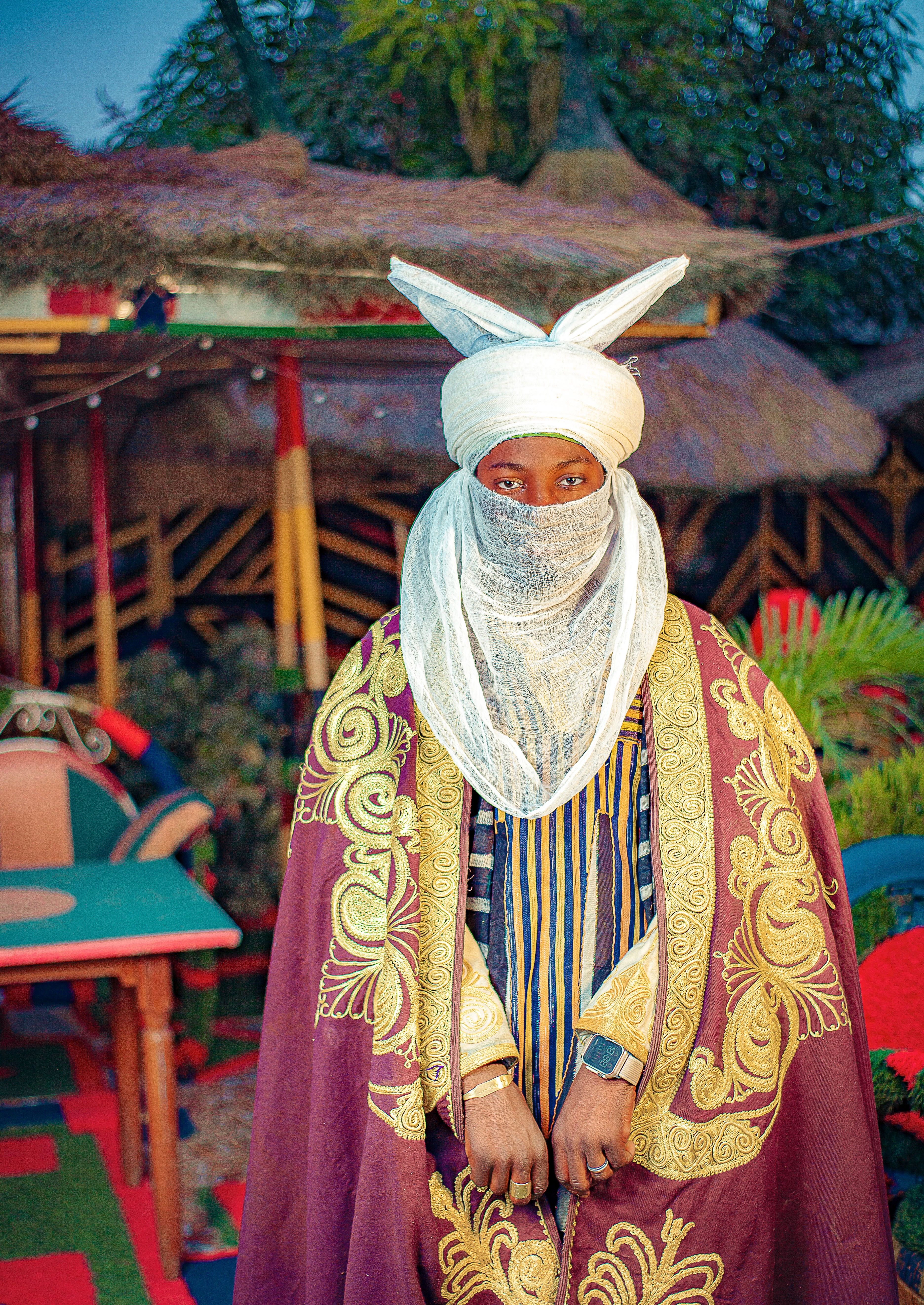 African Royalty in Traditional Attire Outdoors · Free Stock Photo