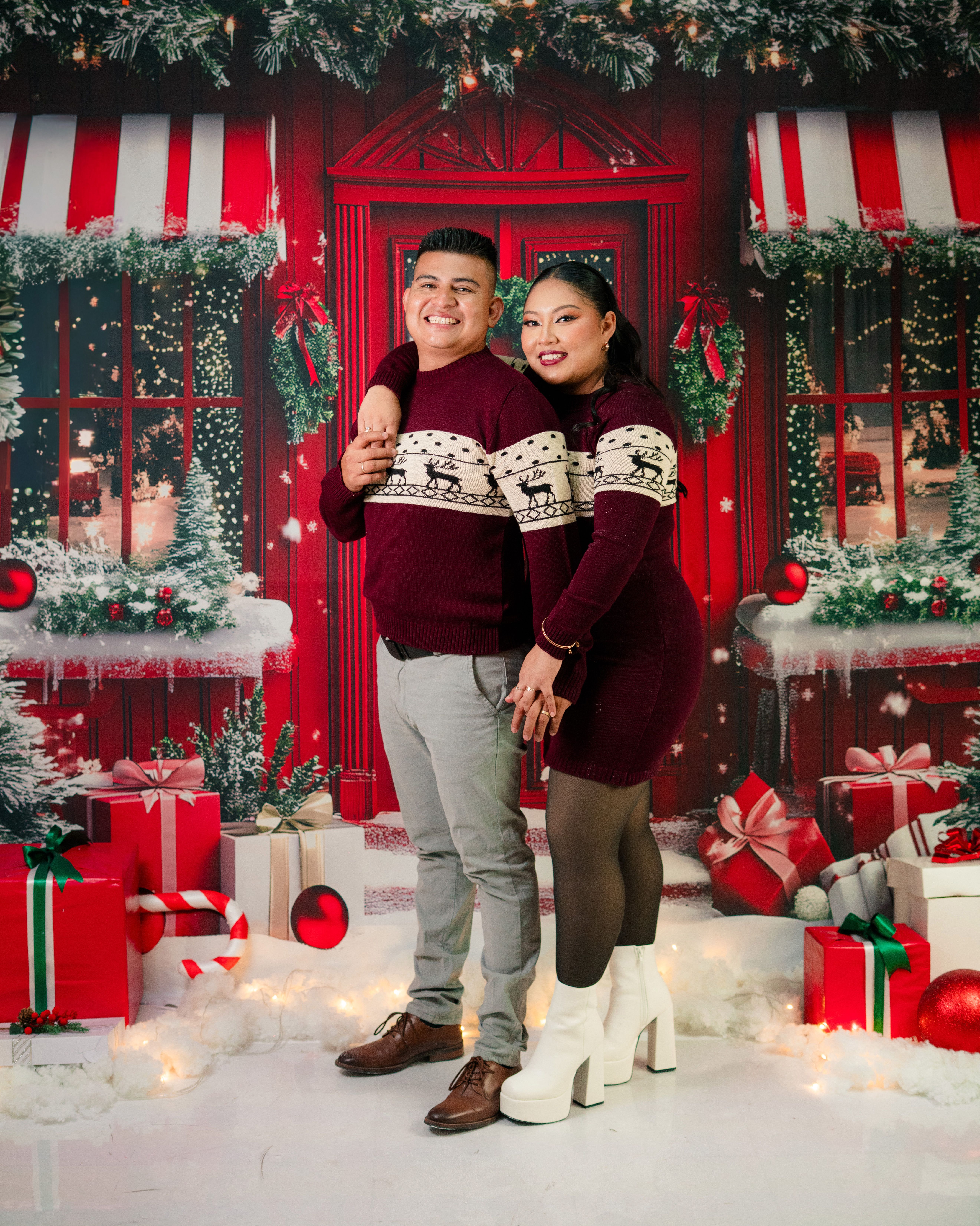Couple in Matching Christmas Sweaters by Festive Decor · Free Stock Photo