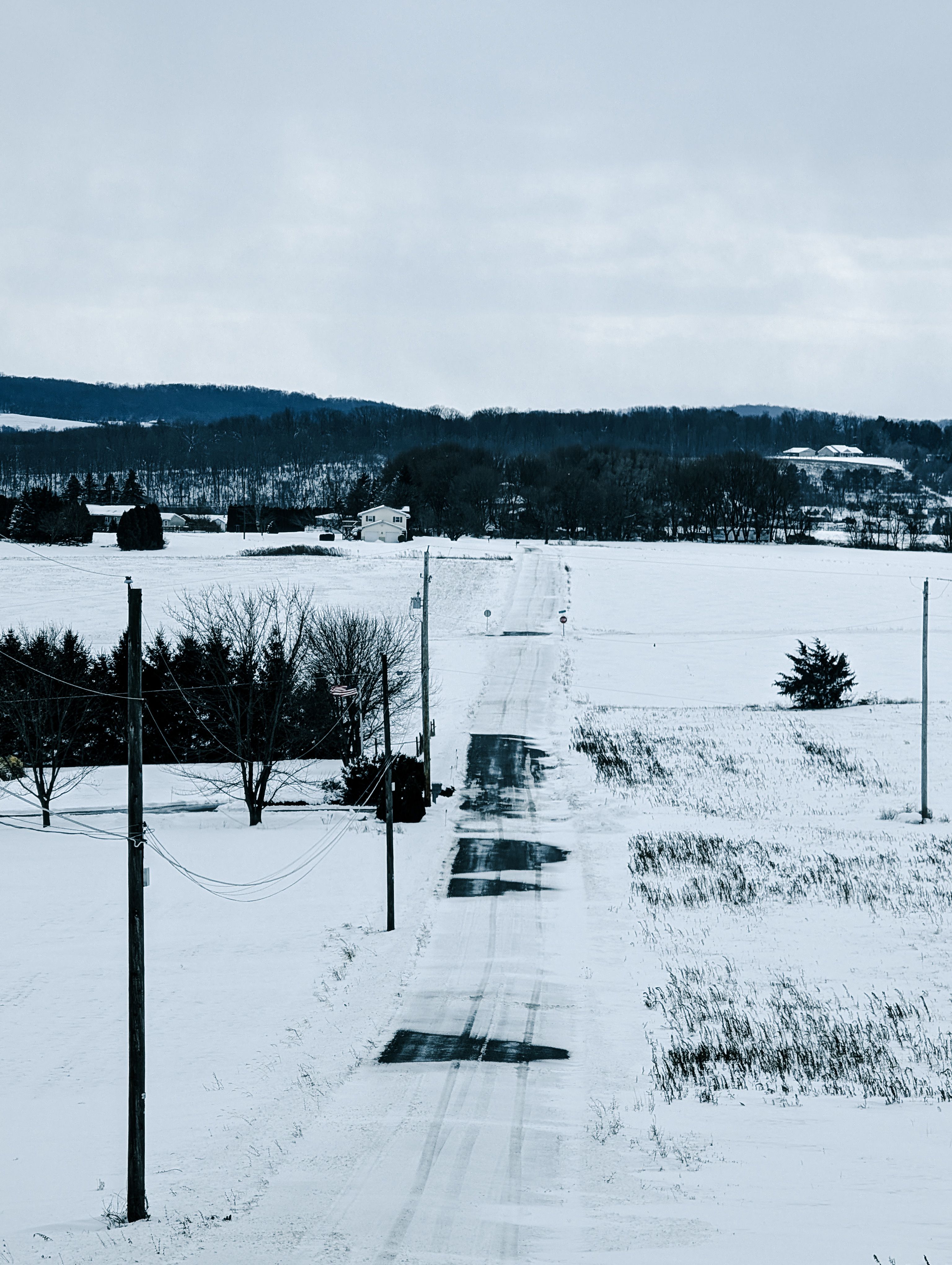 Quiet Winter Road in Snowy Countryside · Free Stock Photo