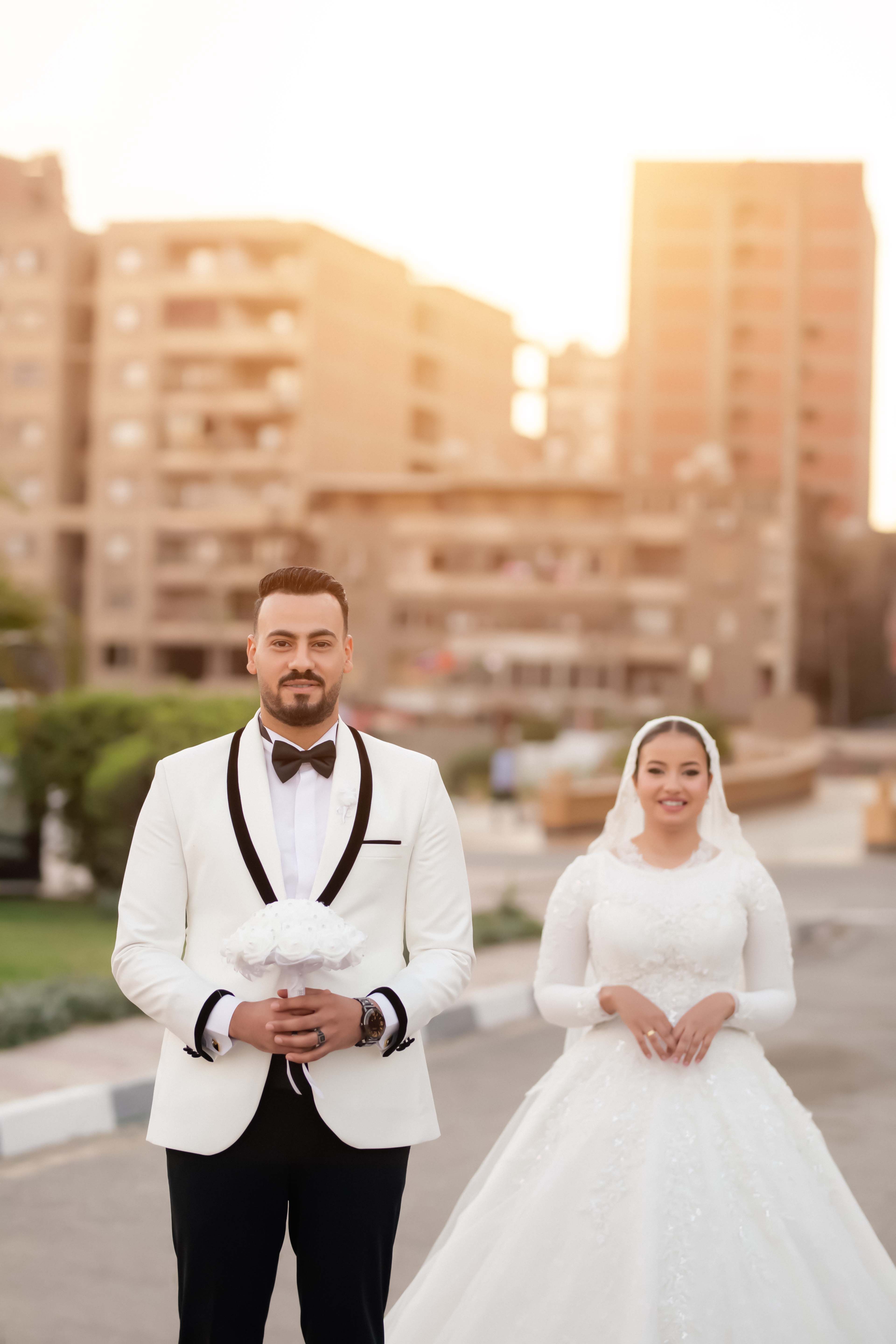 Elegant Wedding Portrait at Sunset · Free Stock Photo