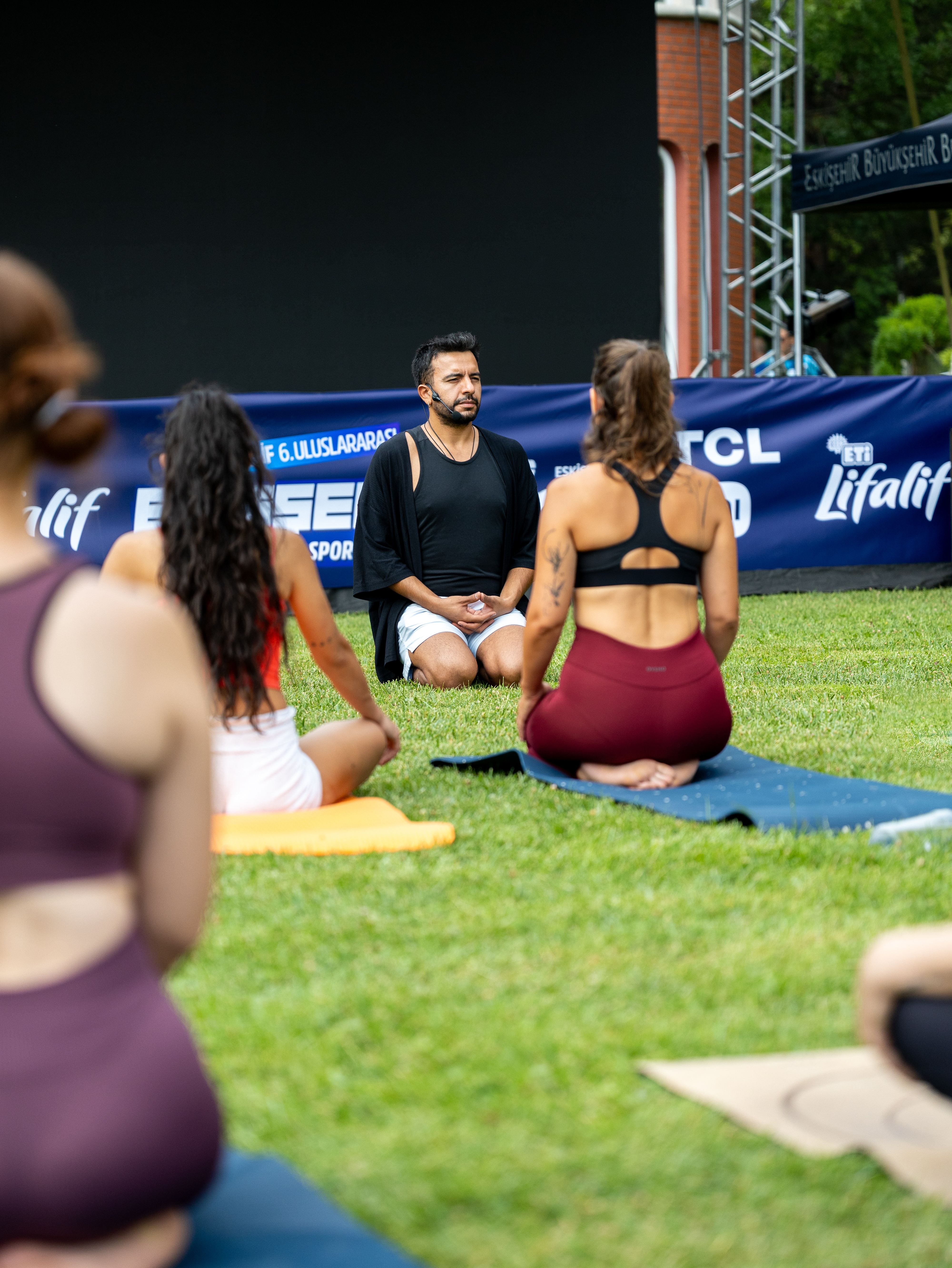 Outdoor Yoga Class in a Park Setting · Free Stock Photo