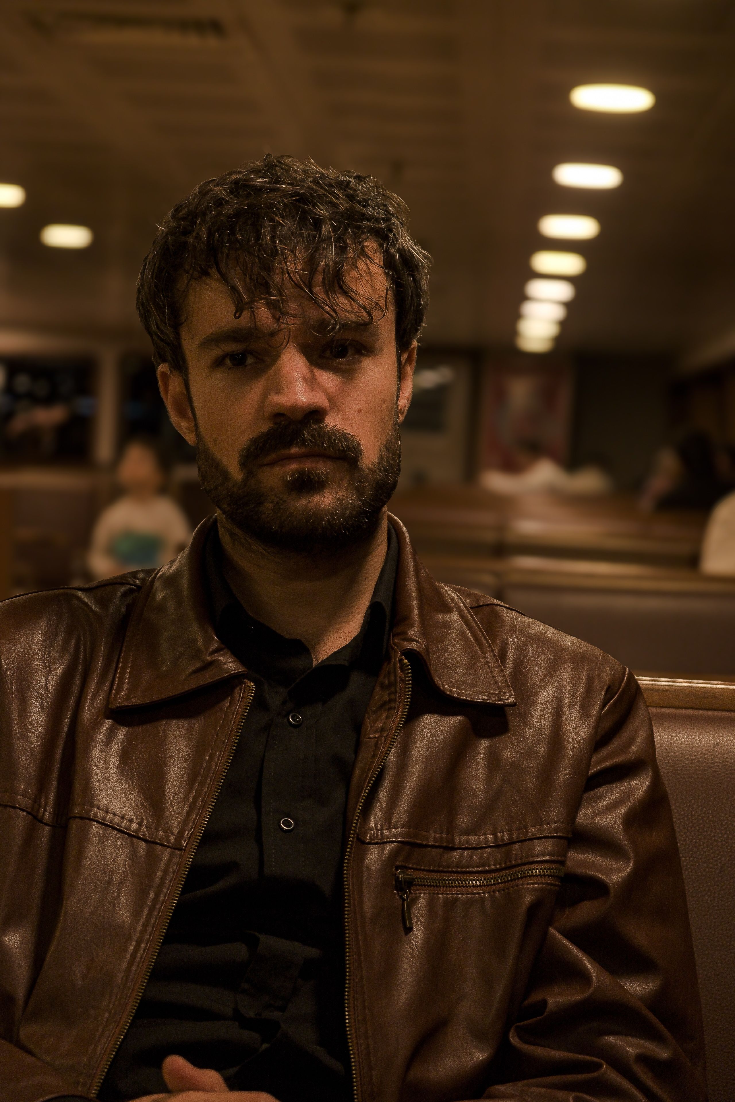 Moody Portrait of Man in Leather Jacket · Free Stock Photo