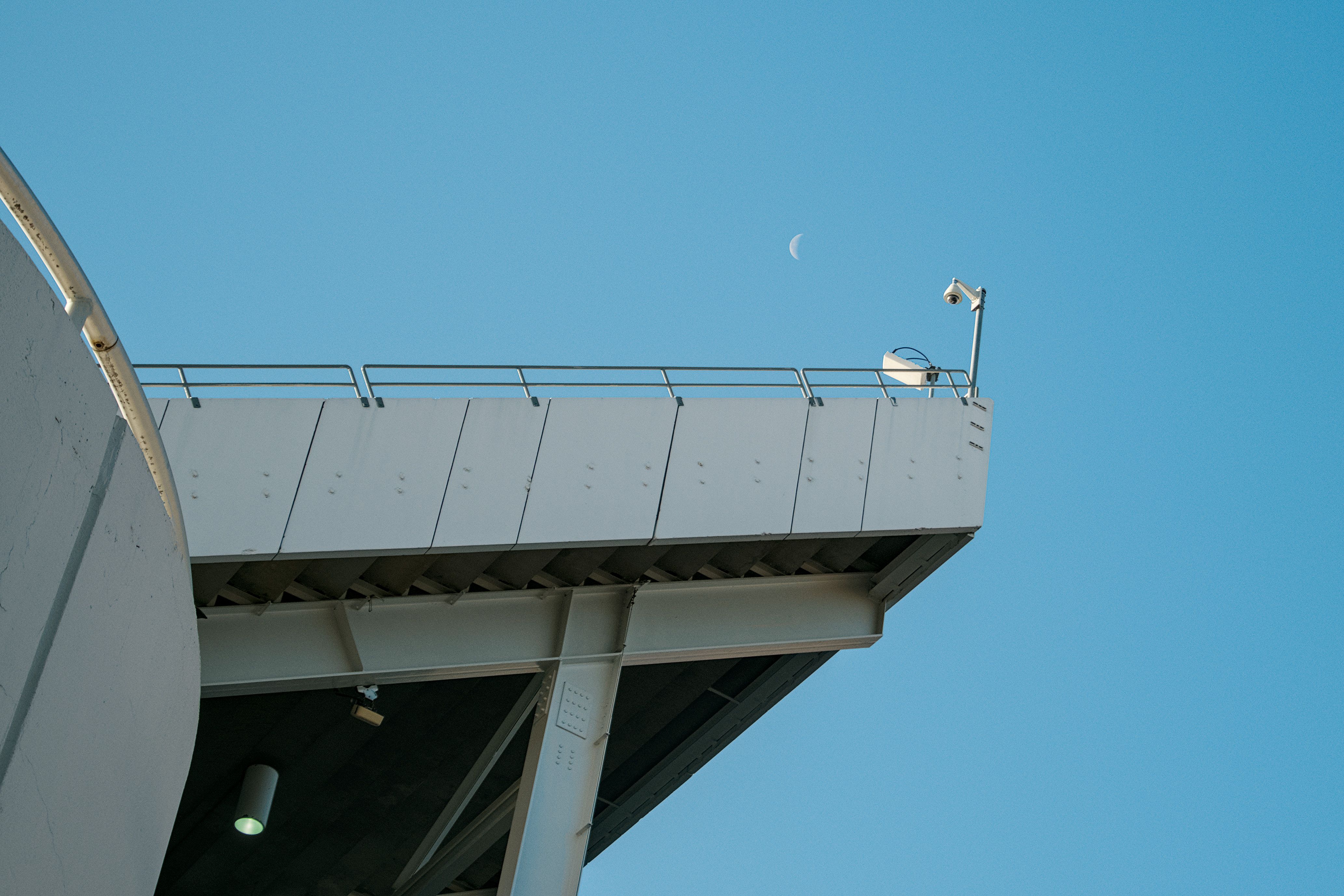 Rooftop Security Camera under Crescent Moon · Free Stock Photo