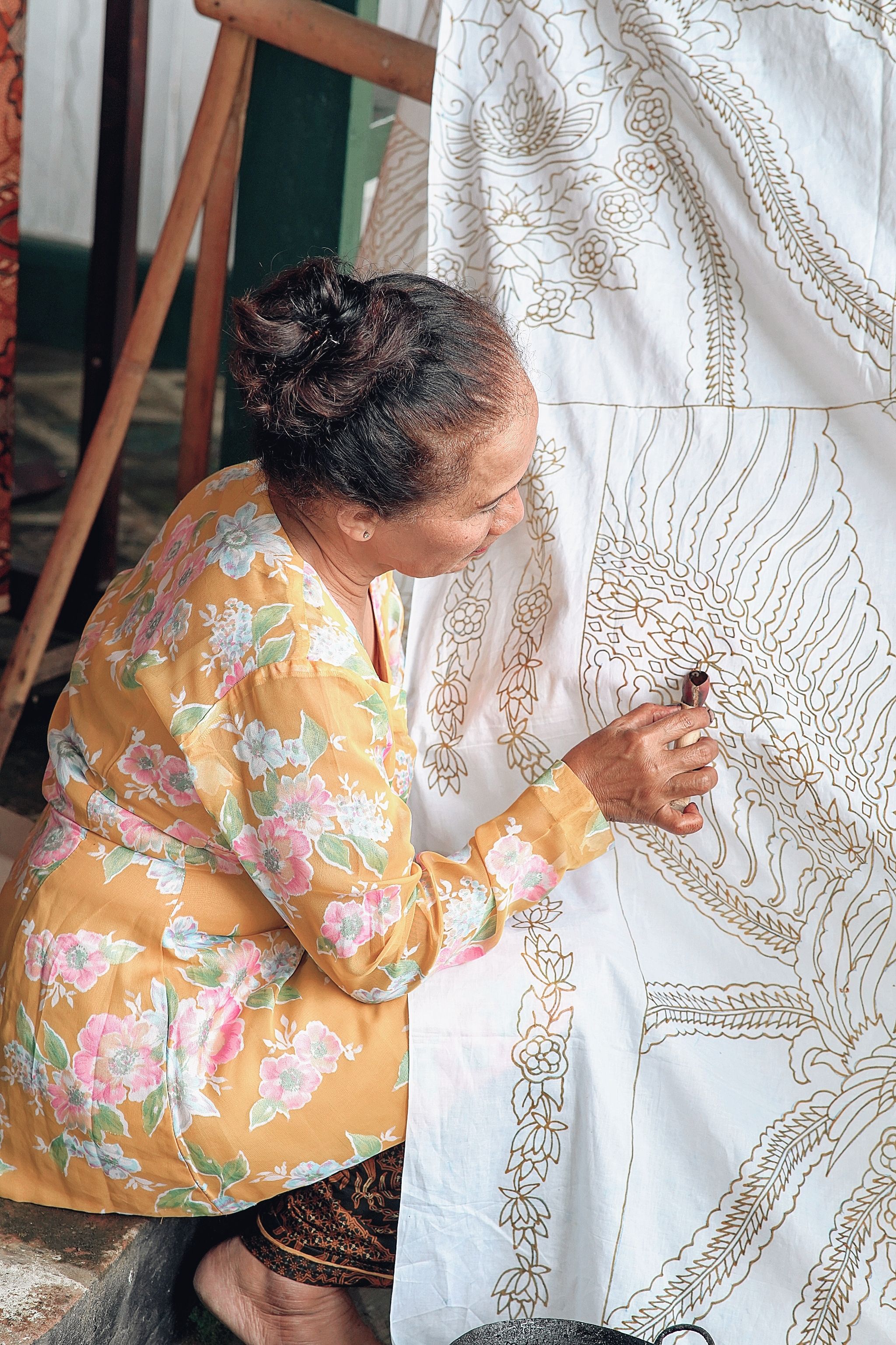 Artisan Crafting Intricate Batik Design in Indonesia · Free Stock Photo