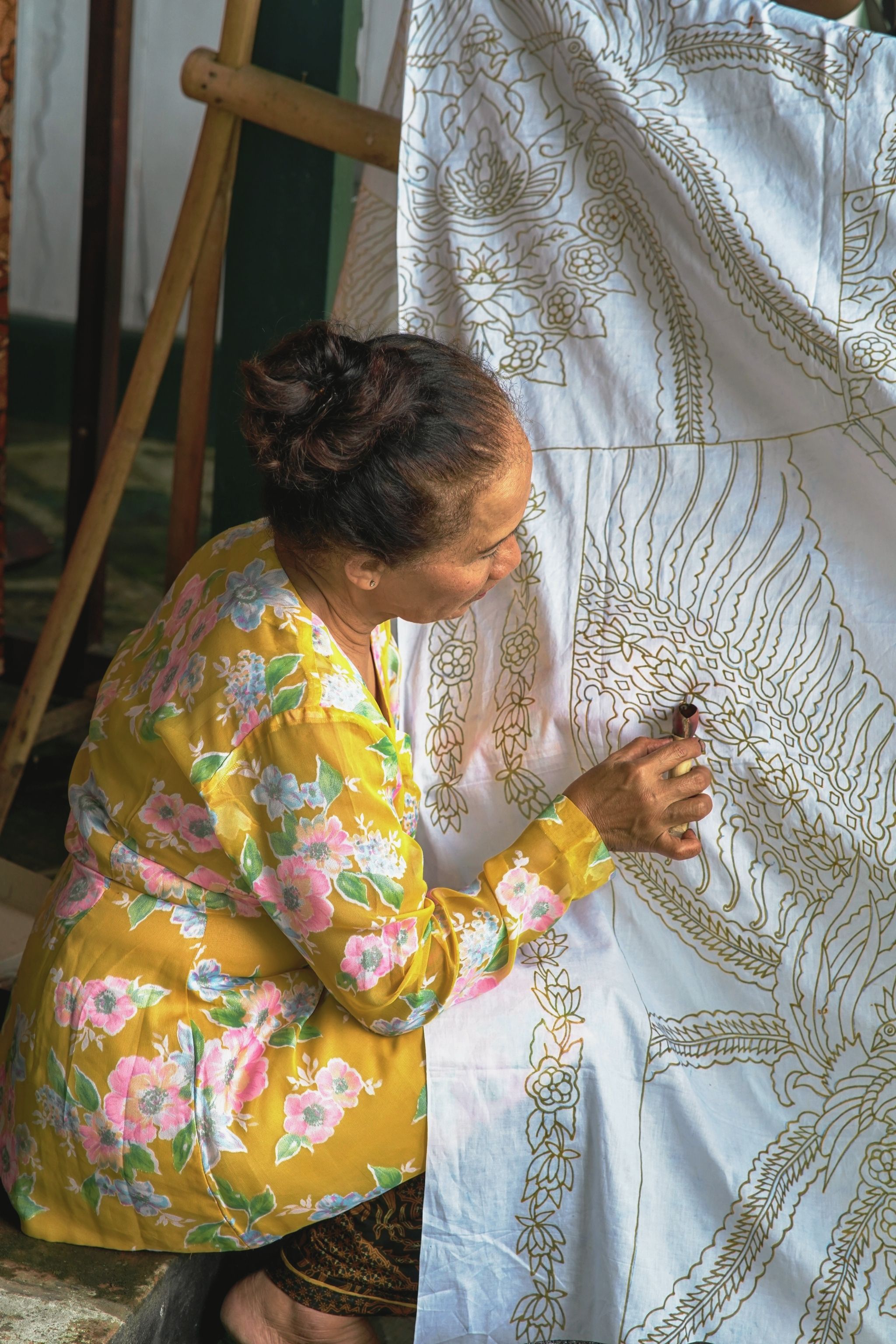 Artisan Crafting Intricate Batik Design in Indonesia · Free Stock Photo