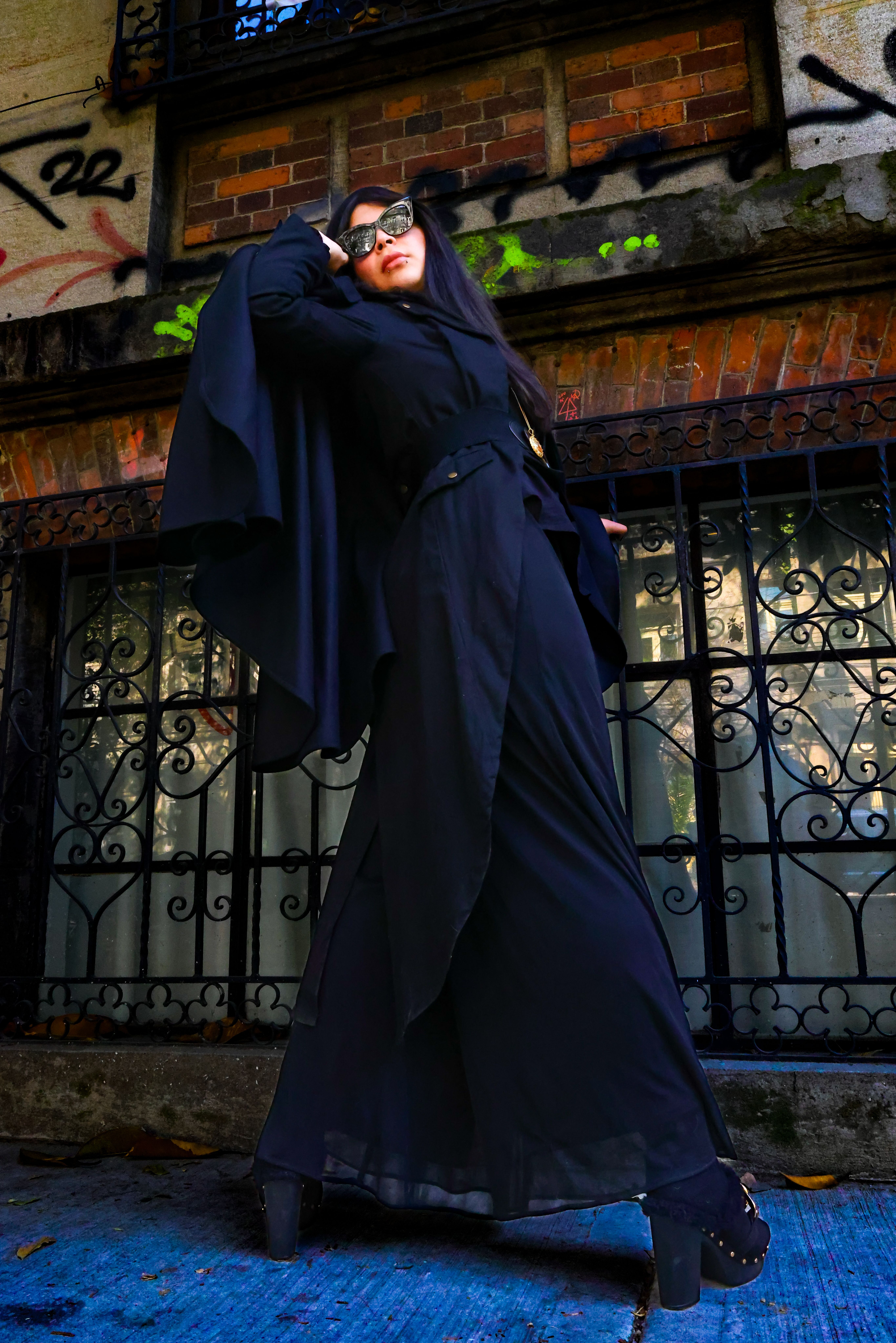 Stylish Woman Posing in Urban Gothic Outfit Outdoors · Free Stock Photo