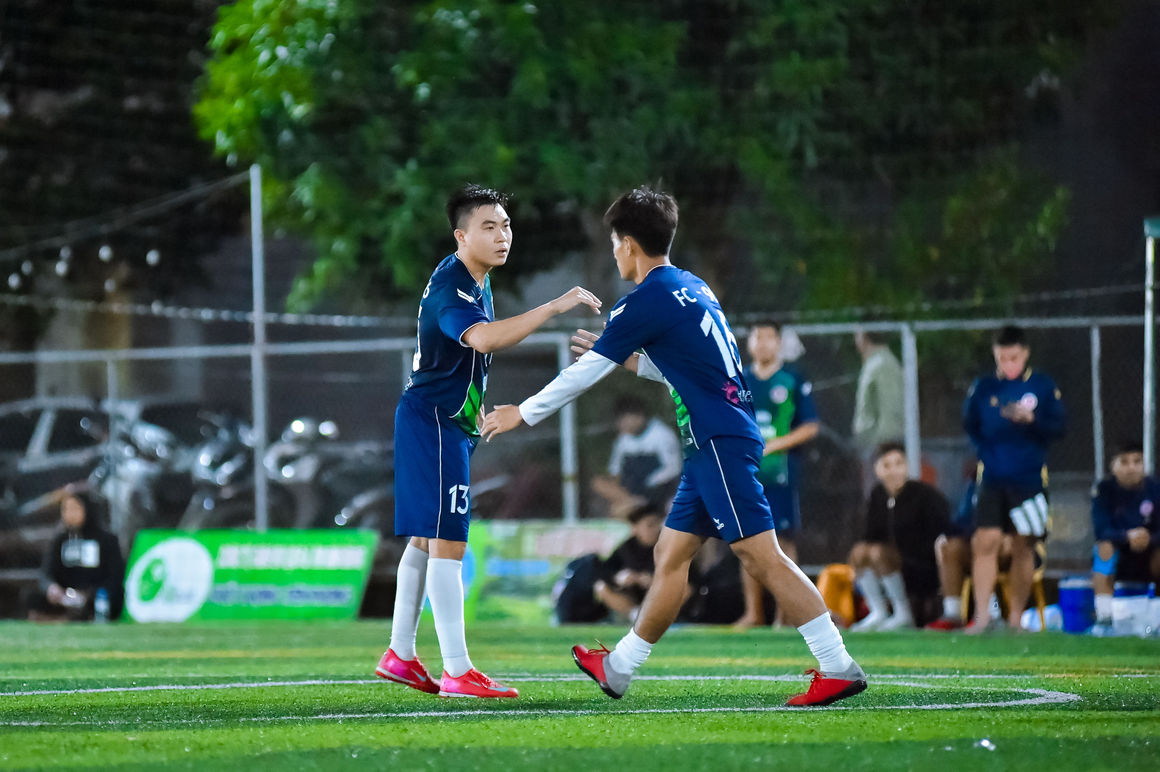 Soccer Players Shaking Hands on Field · Free Stock Photo