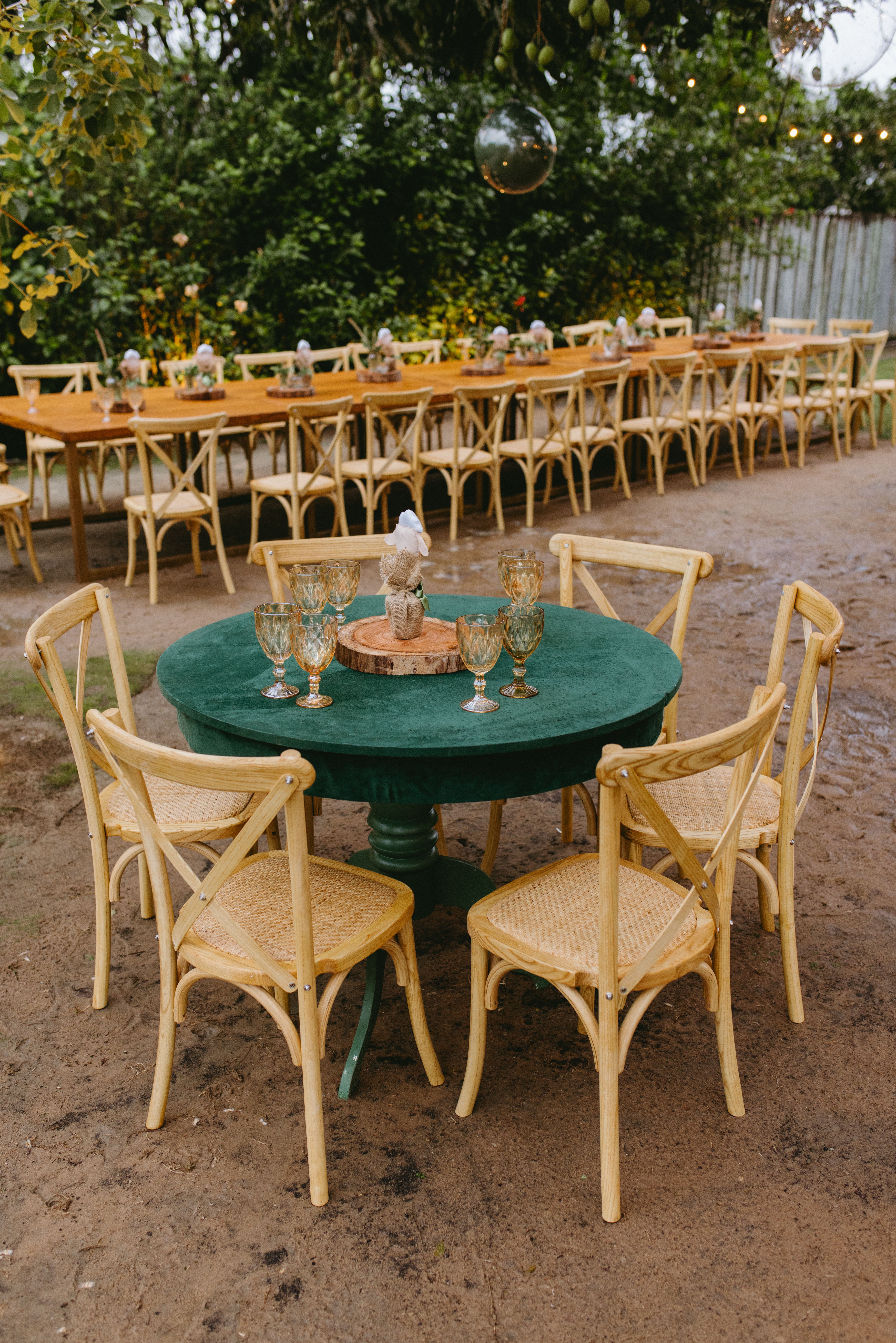 Rustic Outdoor Dining Setup with Wooden Chairs · Free Stock Photo