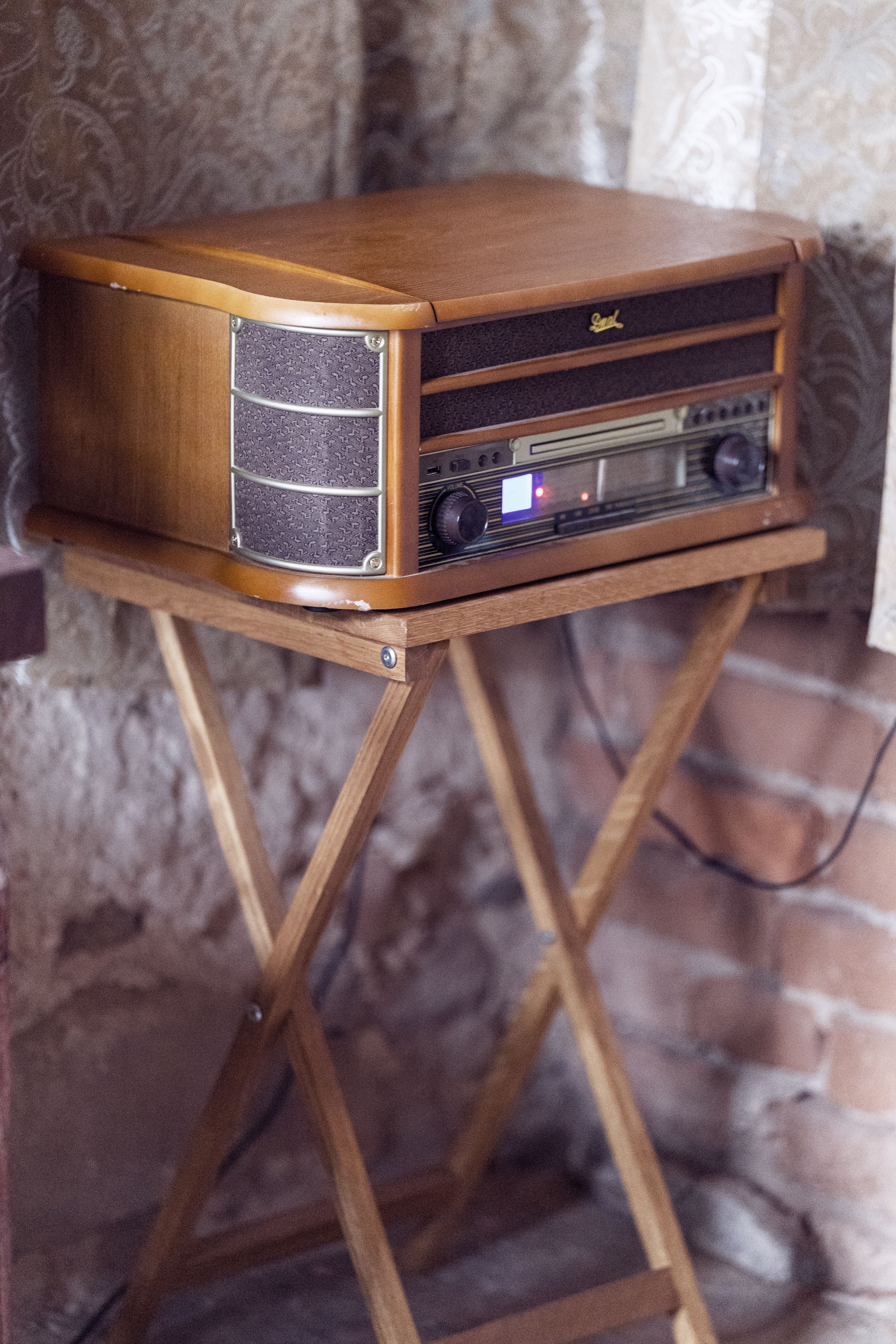 Vintage Wooden Radio on Stand in Retro Interior · Free Stock Photo