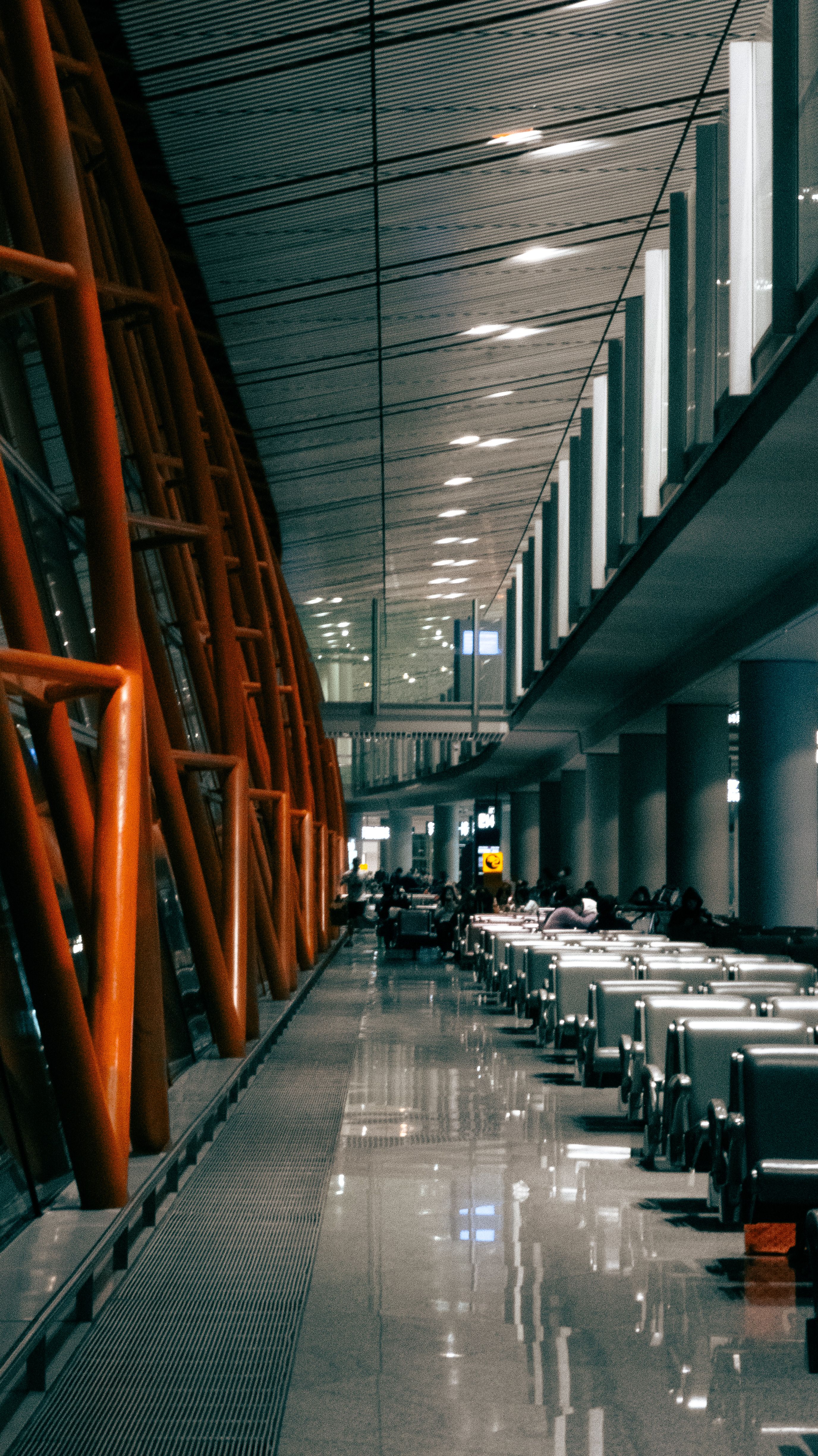 Modern Airport Terminal Interior with Seating Area · Free Stock Photo