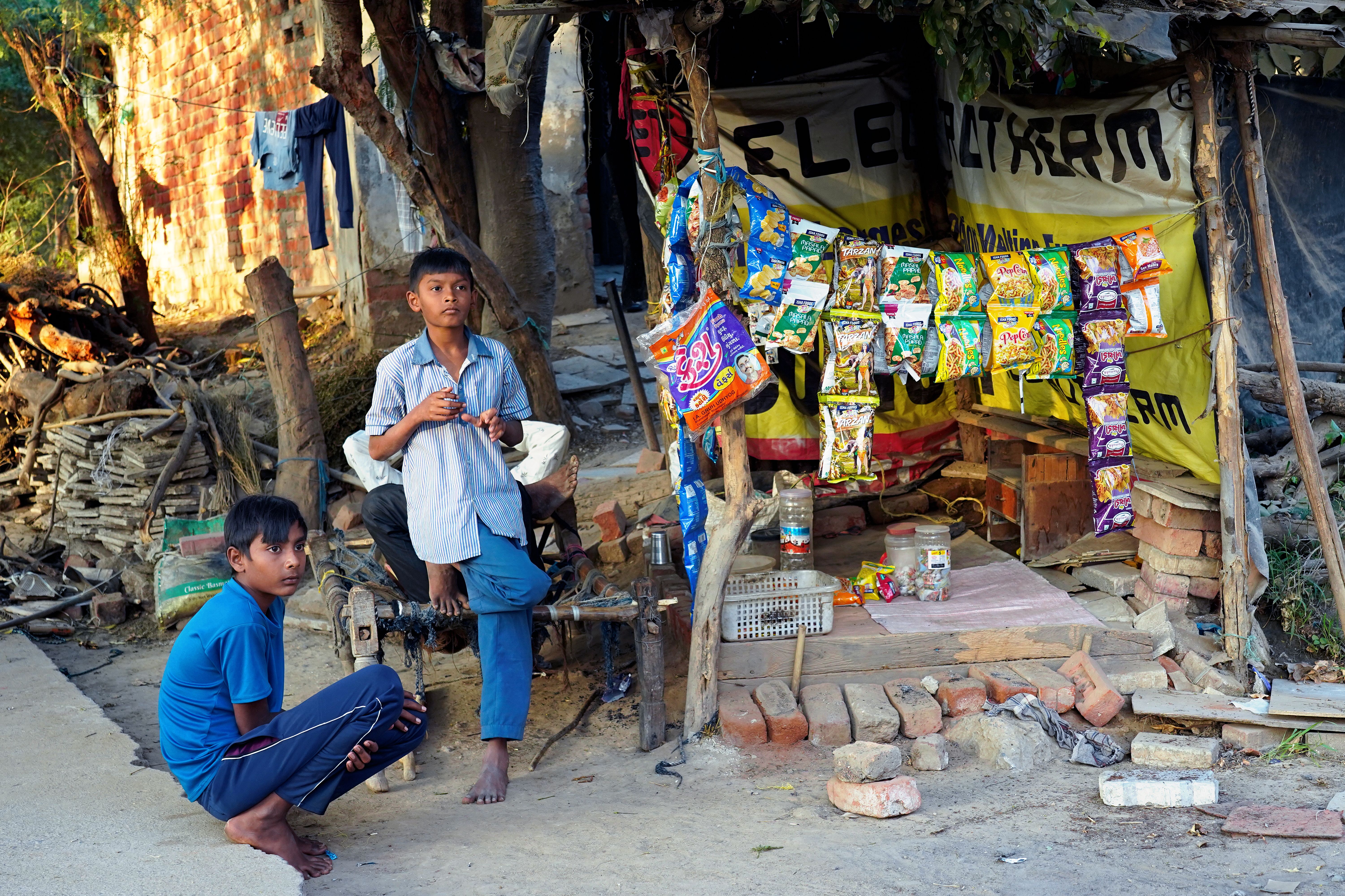 Rural Indian Street Scene with Local Snack Stall · Free Stock Photo