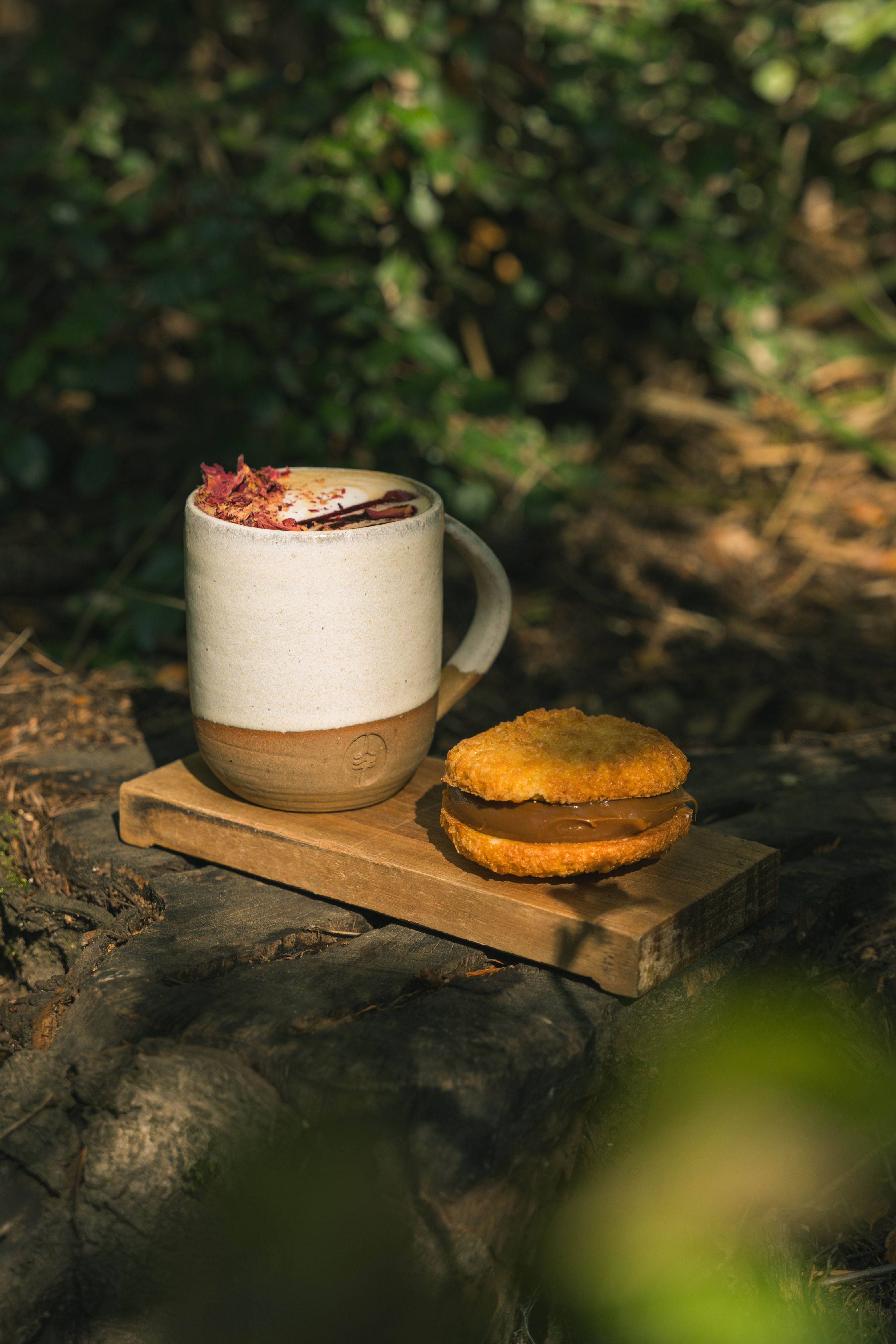 Rustic outdoor coffee and cookie setting · Free Stock Photo