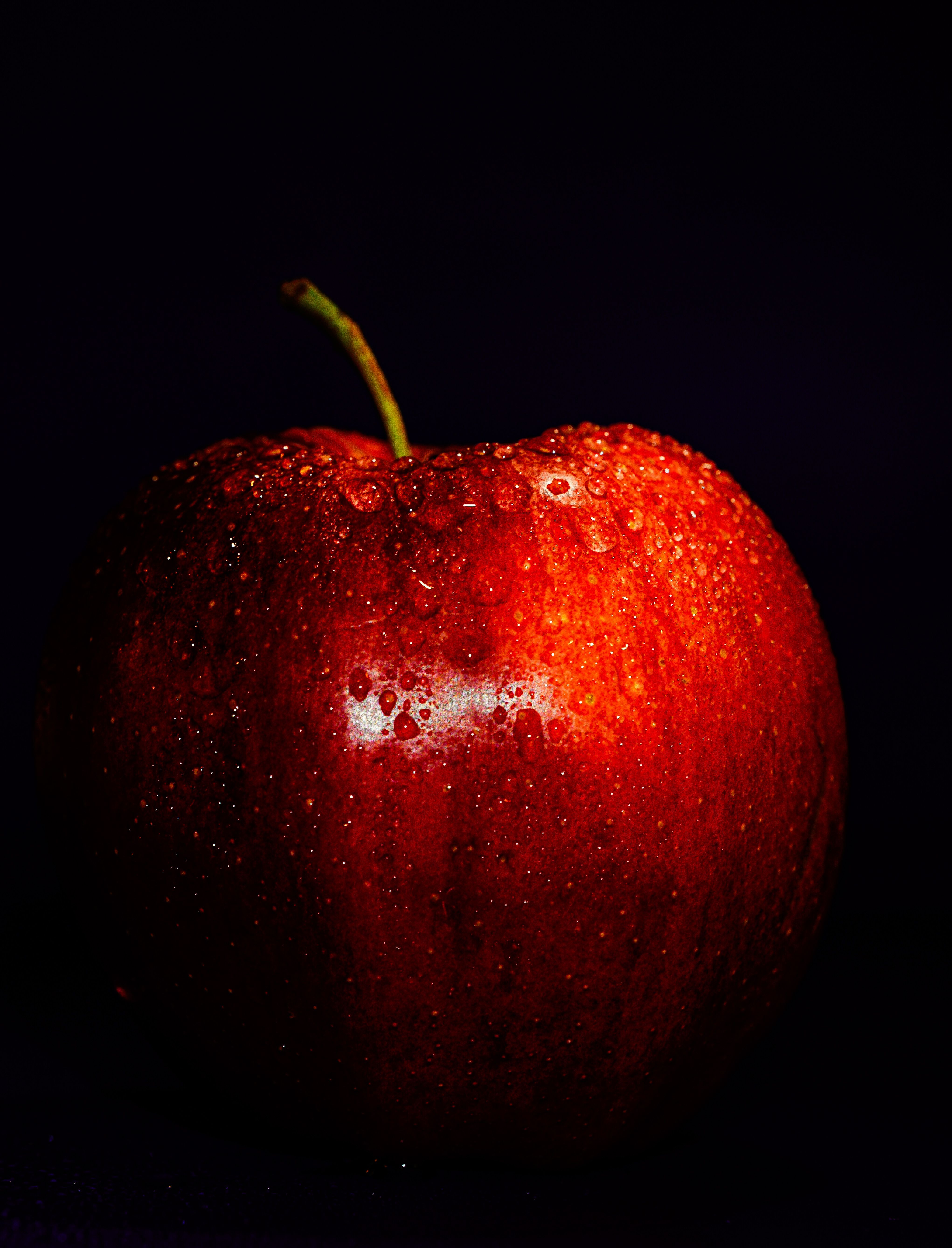Vibrant Red Apple with Water Droplets · Free Stock Photo