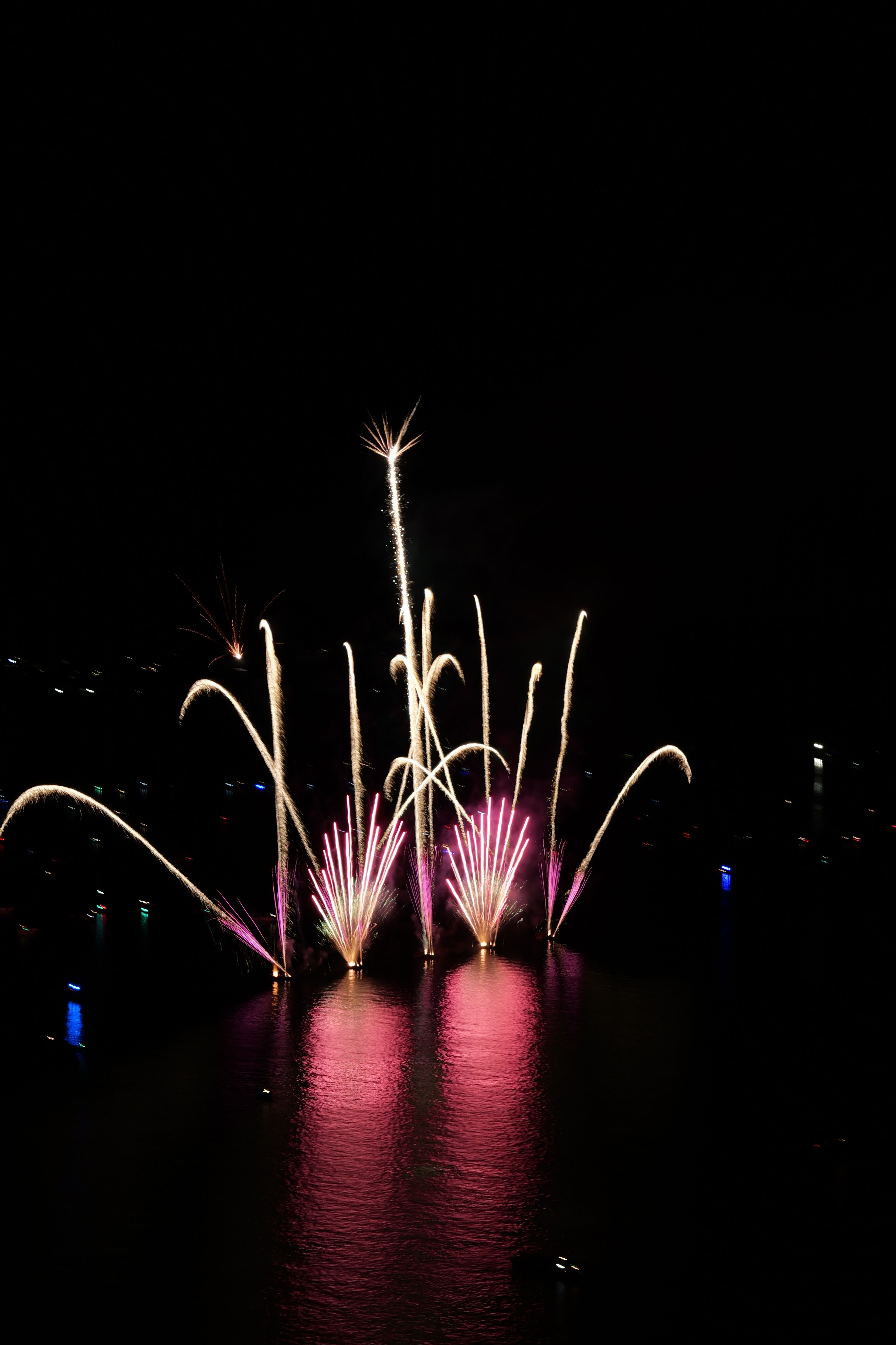 Stunning Fireworks Display Over Water at Night · Free Stock Photo