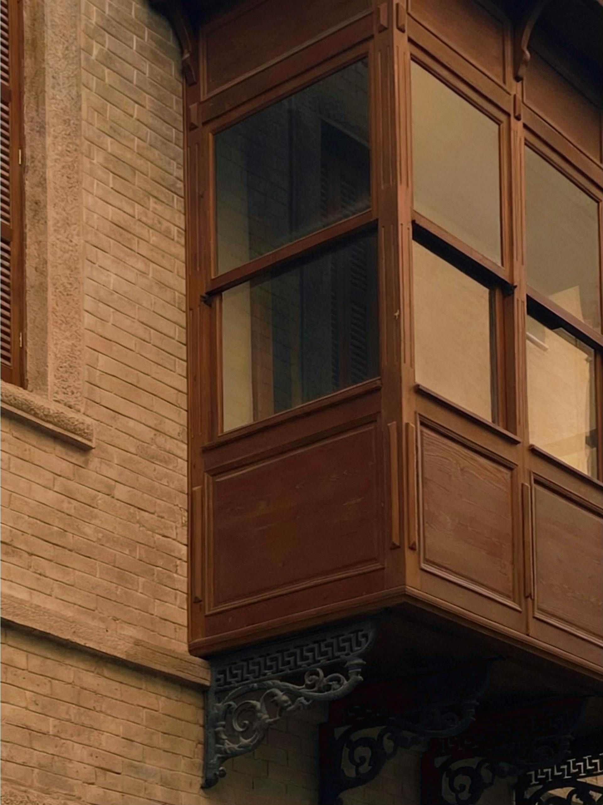 Elegant Wooden Bay Window on Brick Wall · Free Stock Photo