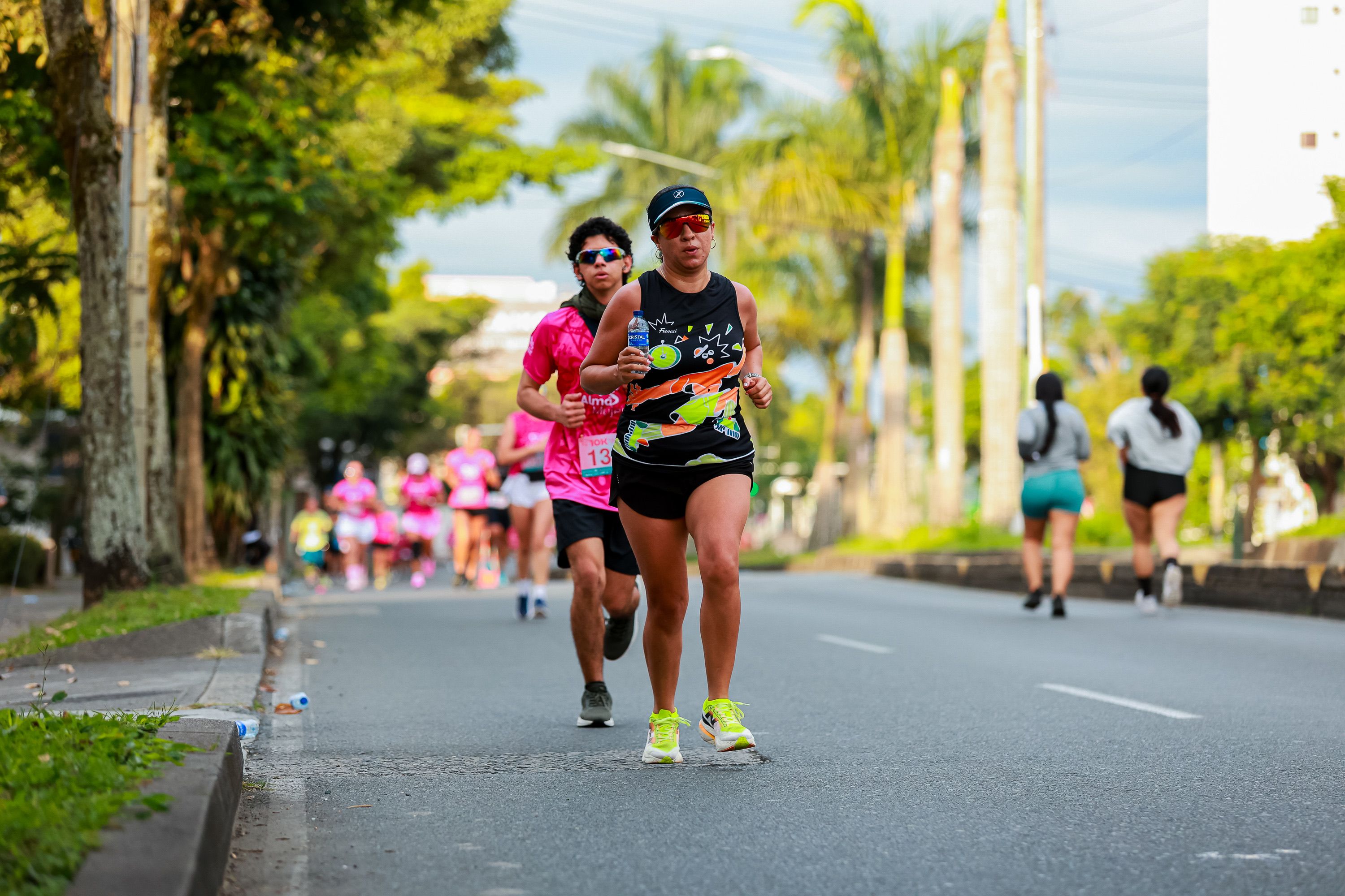 Energetic Runners Competing in Outdoor Marathon · Free Stock Photo